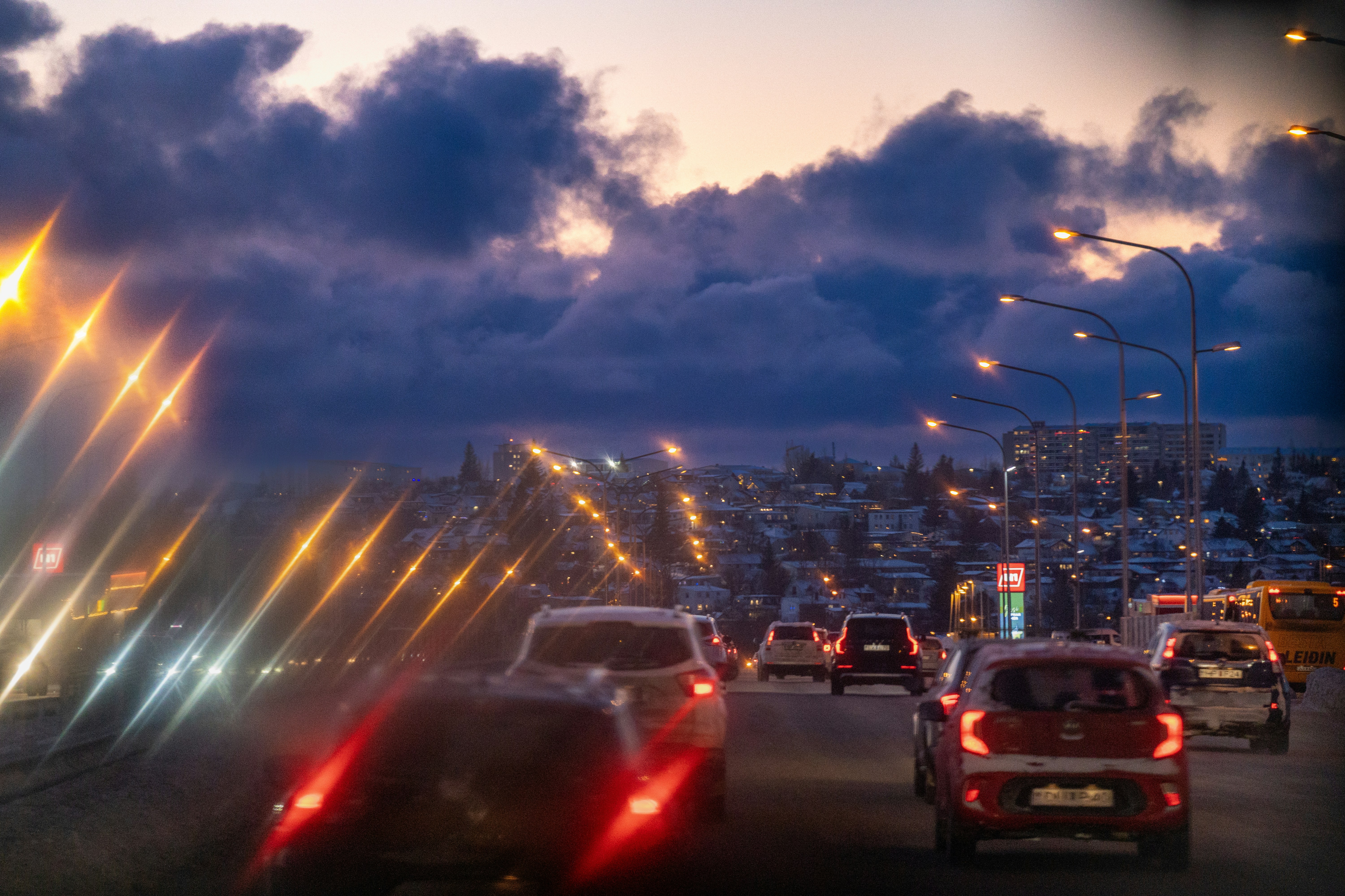 Dusk Velocity: Neon Trails on a City Highway