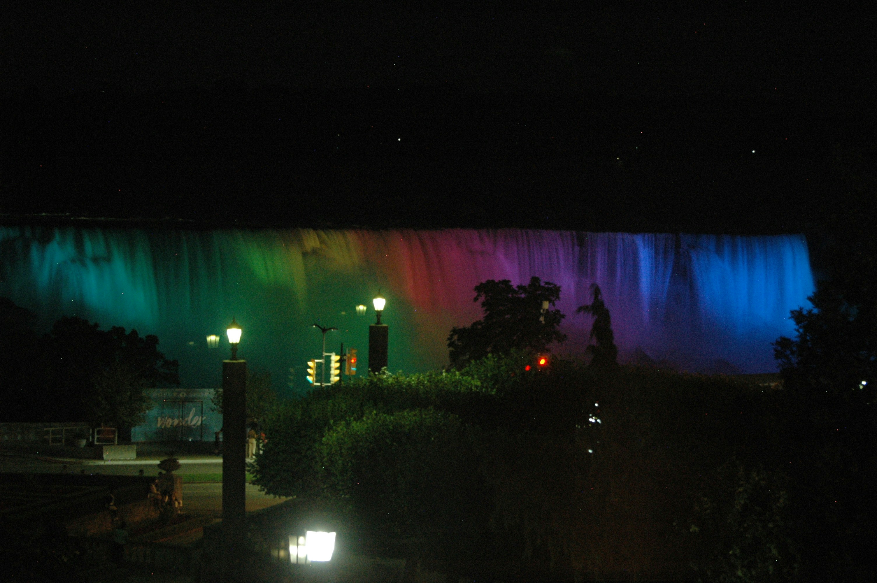 A rainbow colored waterfall lit up at night photo – Free Niagara falls ...