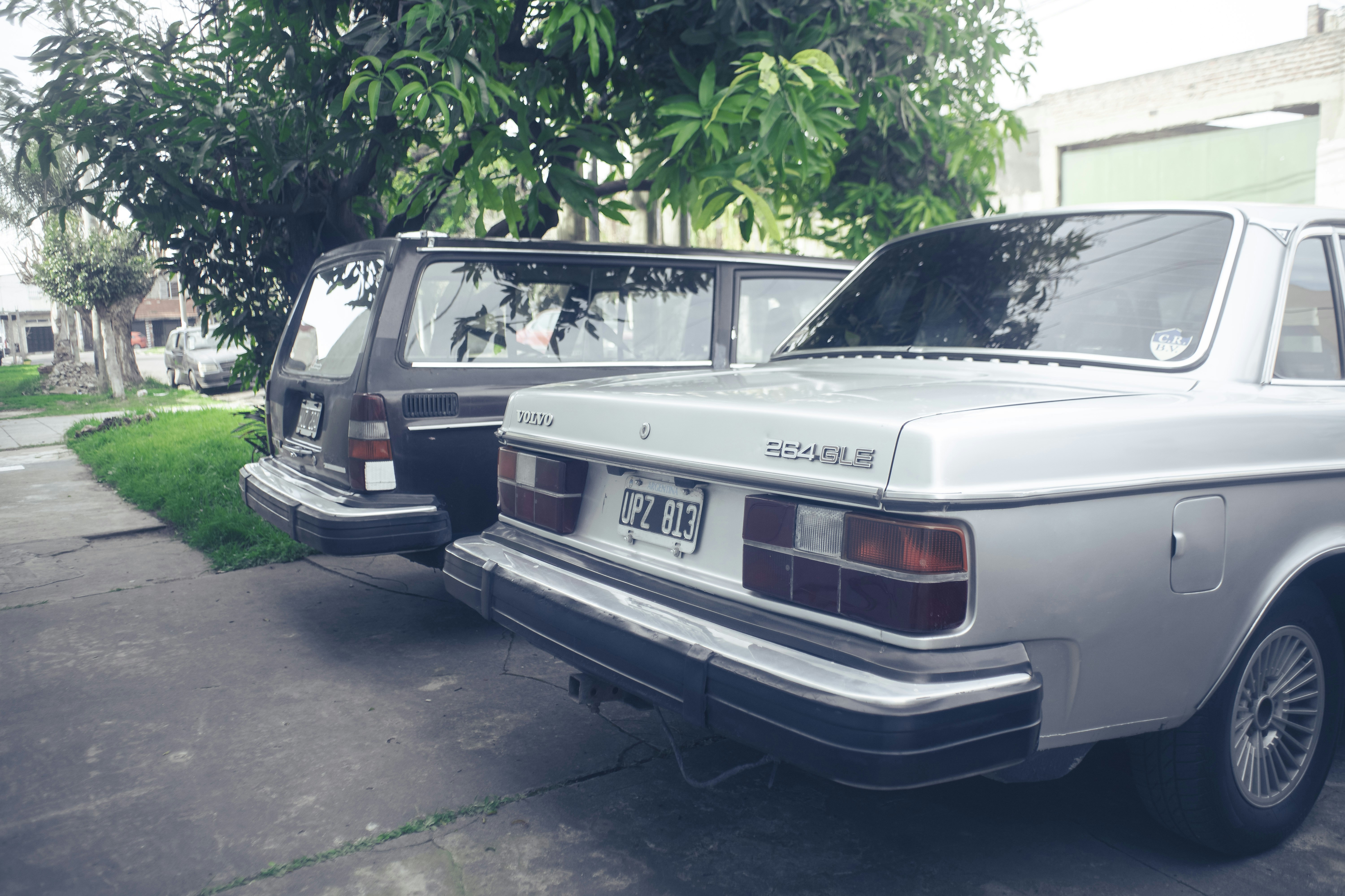a couple of cars parked next to each other