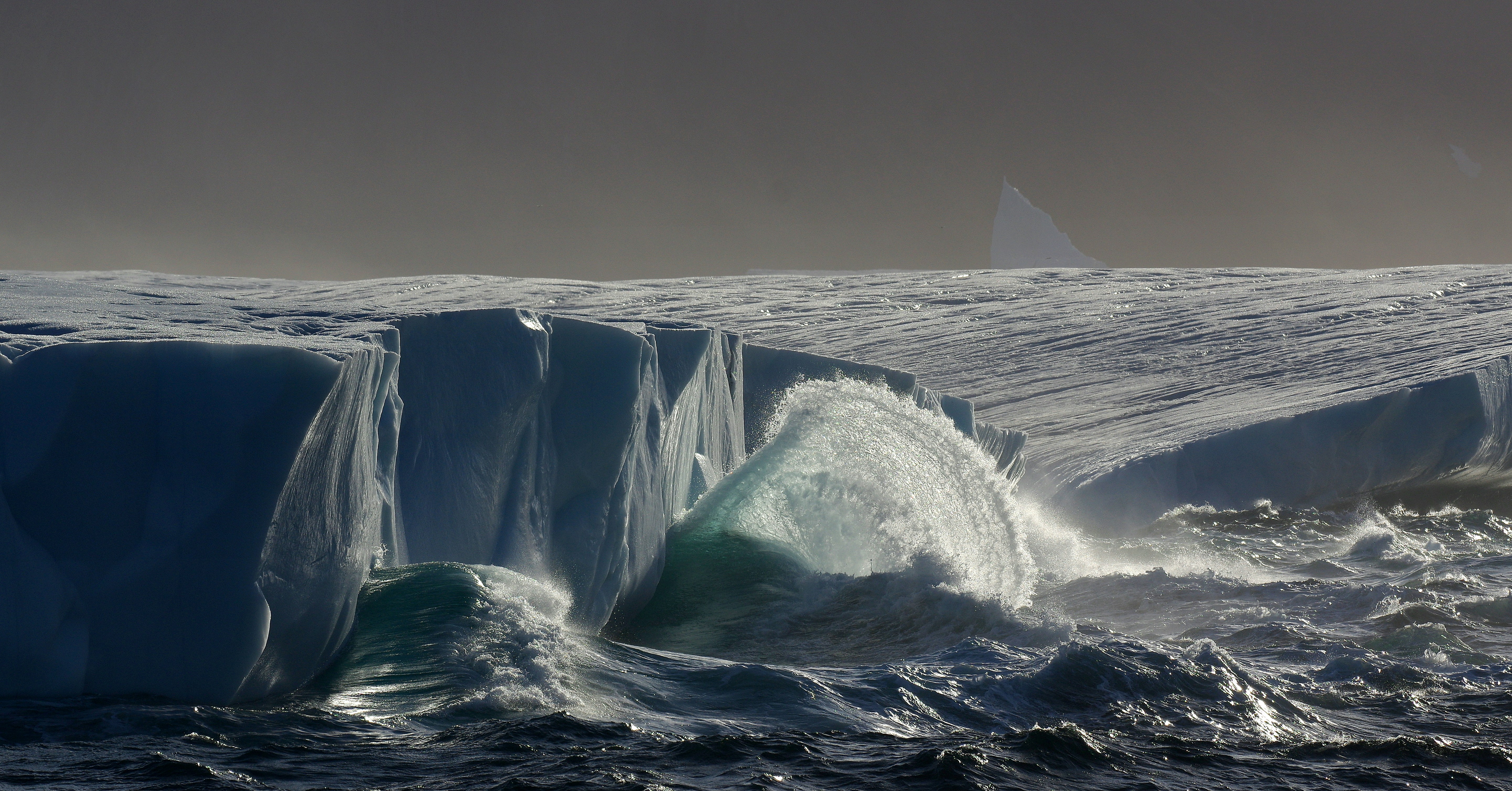 A large iceberg in the middle of the ocean photo – Free Ice Image on ...