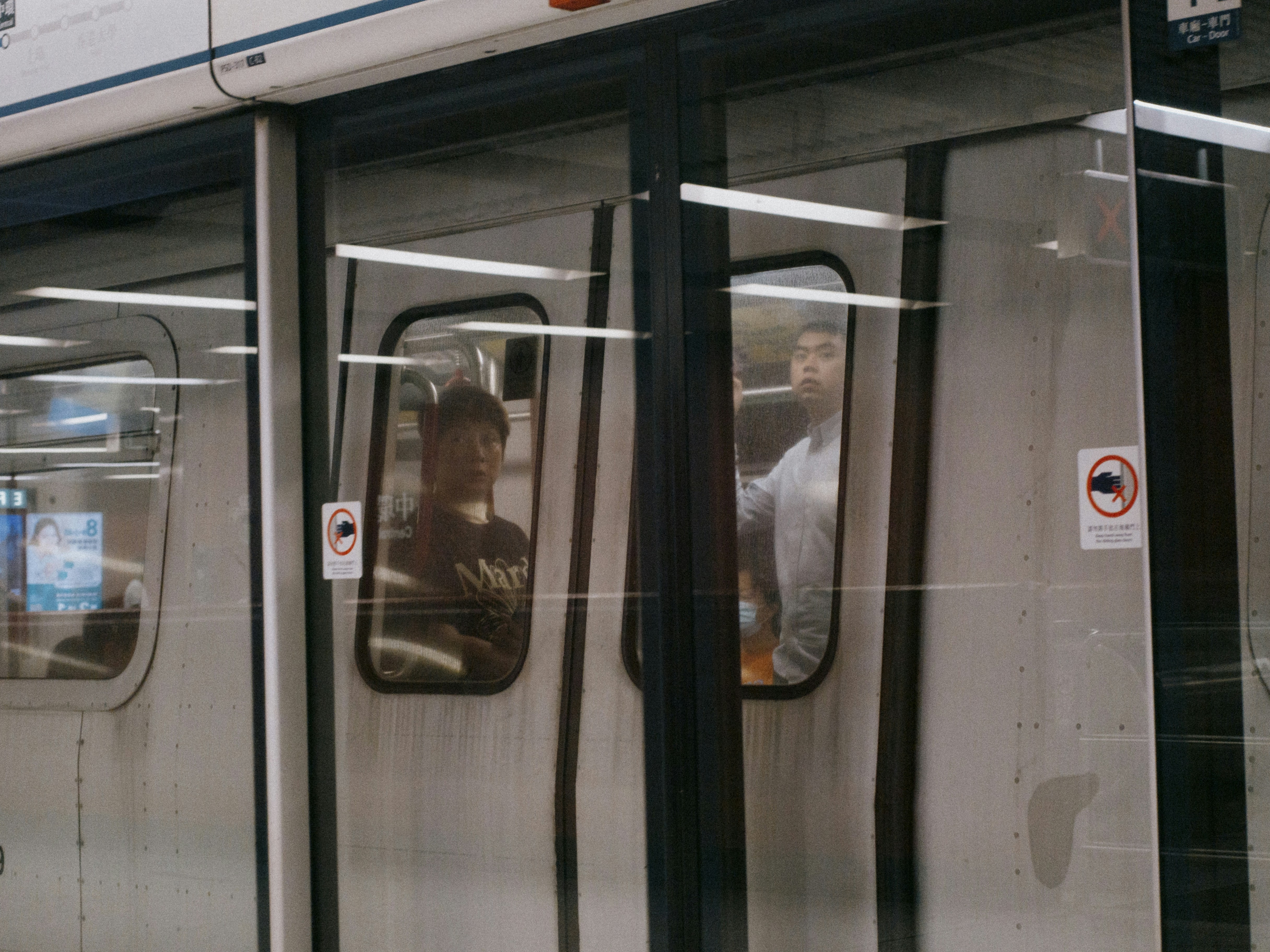 The reflection of a man in a train window photo – Free Street Image on ...