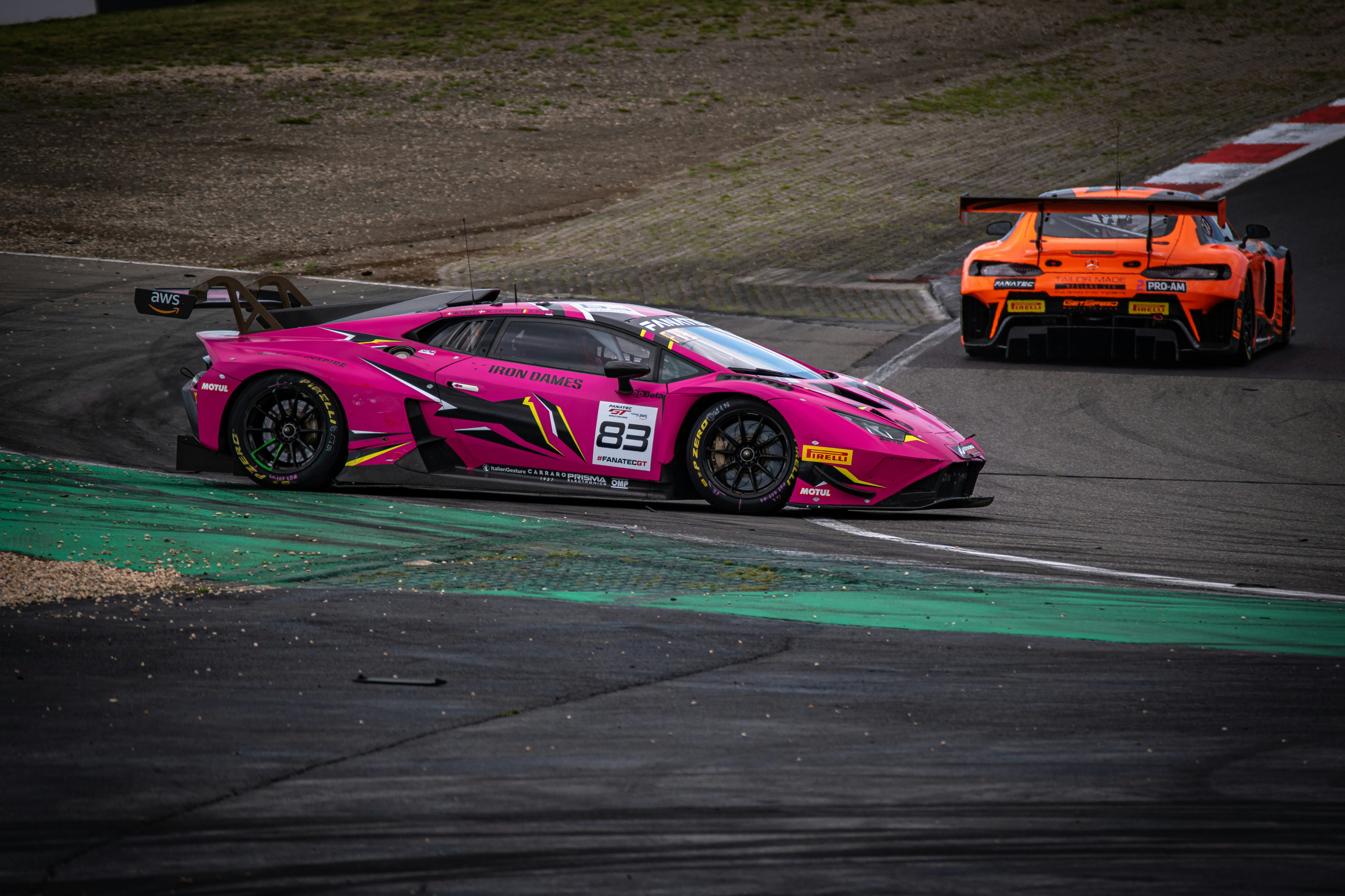A pink sports car driving on a race track photo – Free Nürburgring ...