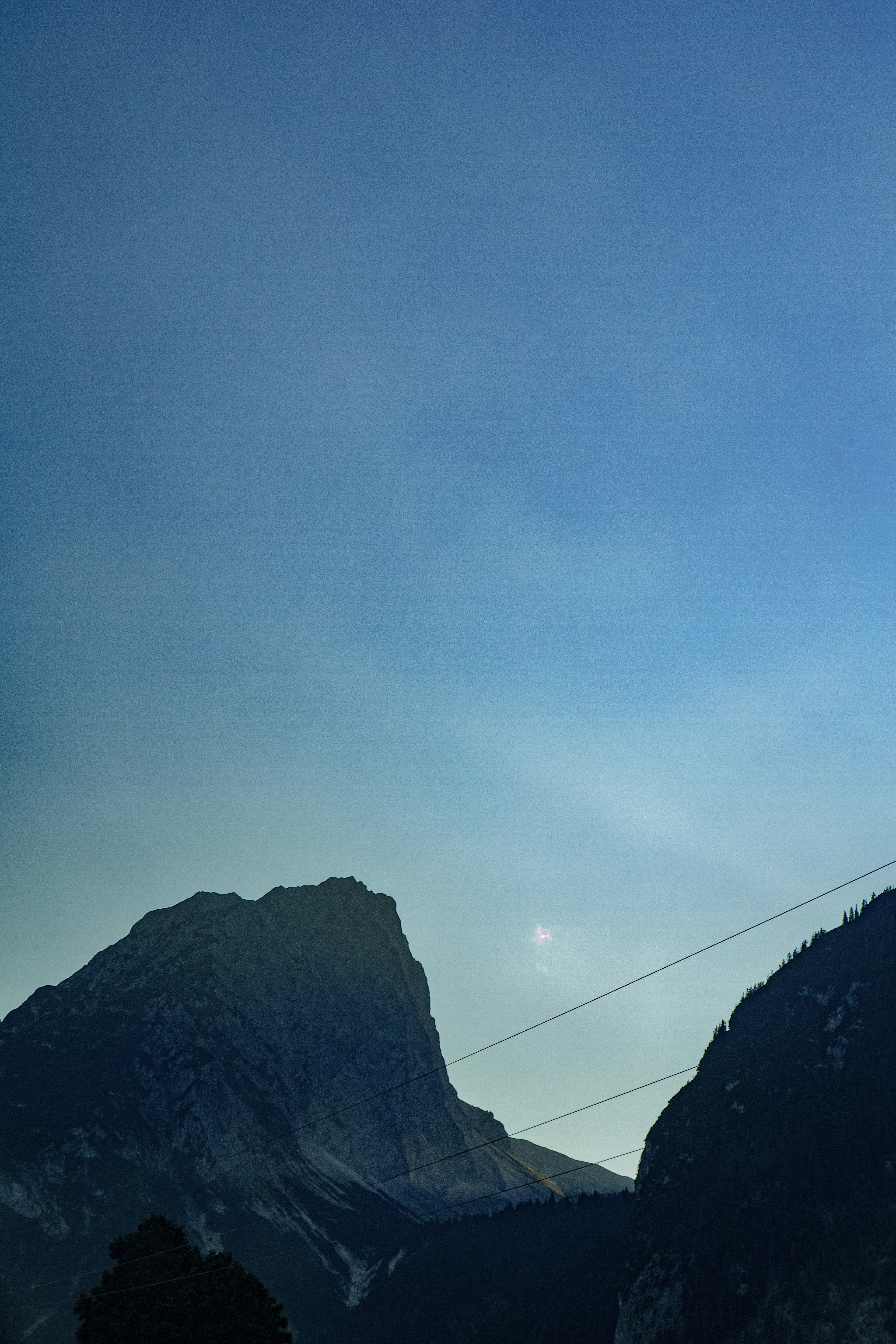 Craggy Sentinel Under a Clear Blue Sky