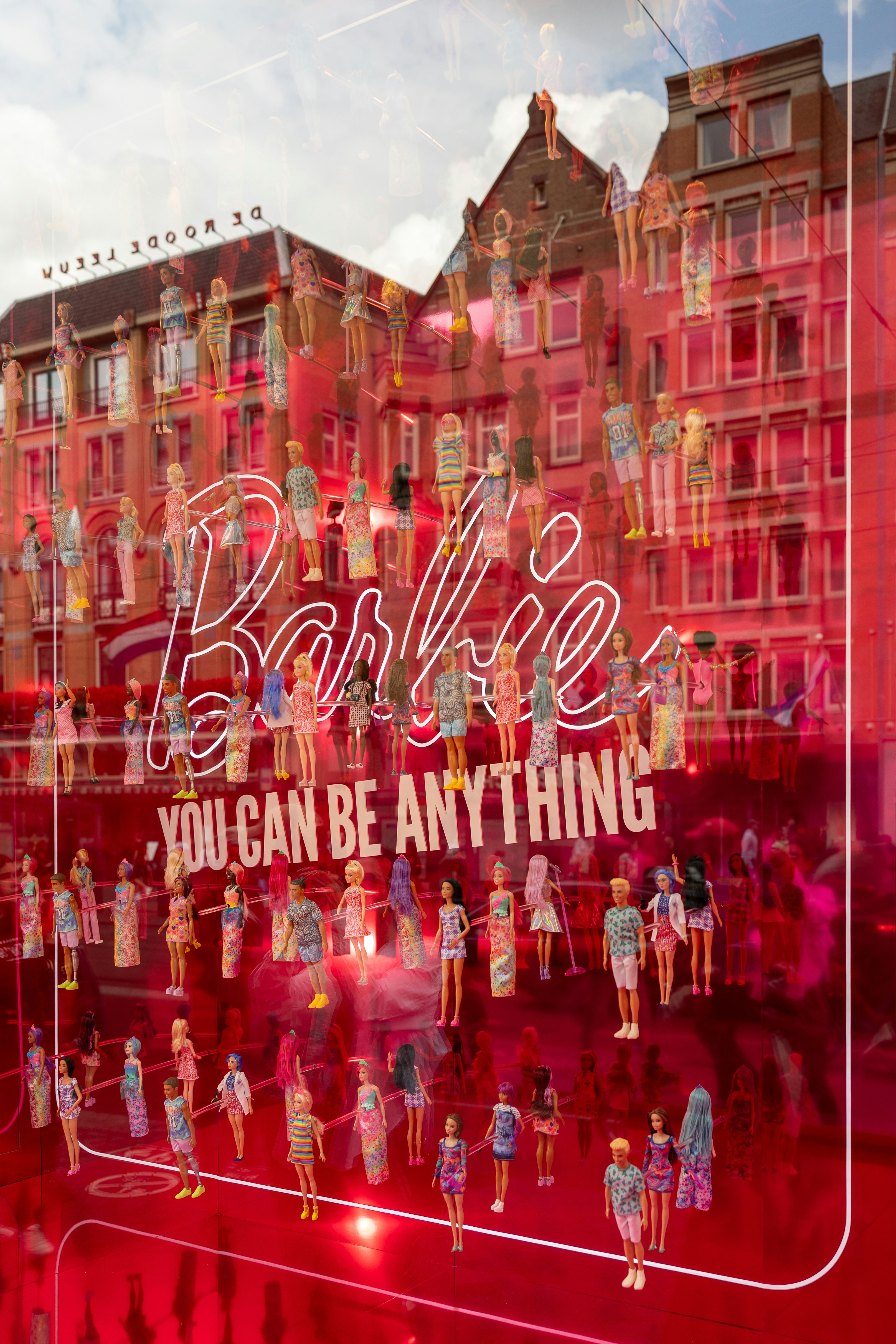 A window display of barbie dolls in a store photo – Free Amsterdam ...