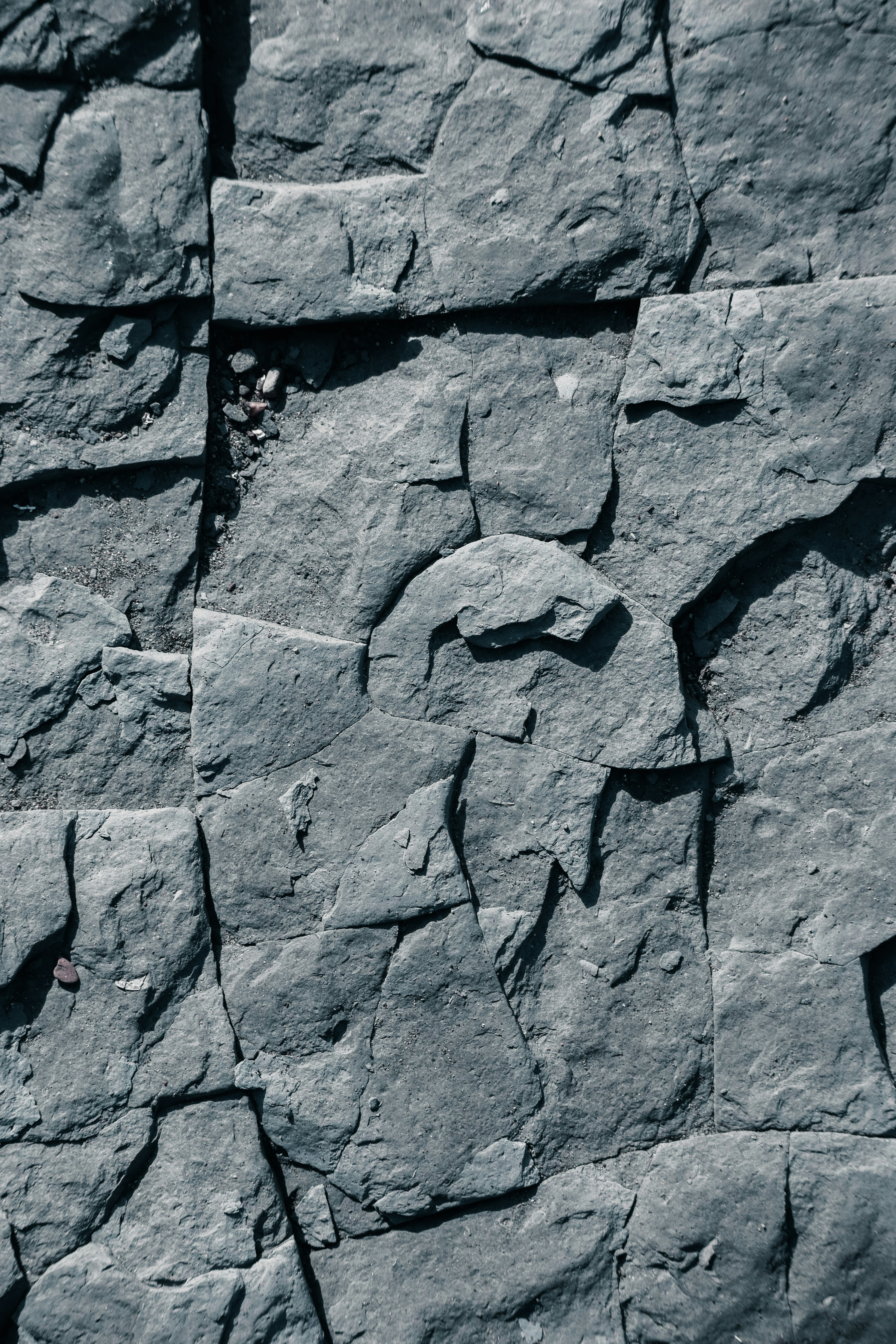 A close up of a rock wall made of rocks photo – Free Wallpaper Image on ...