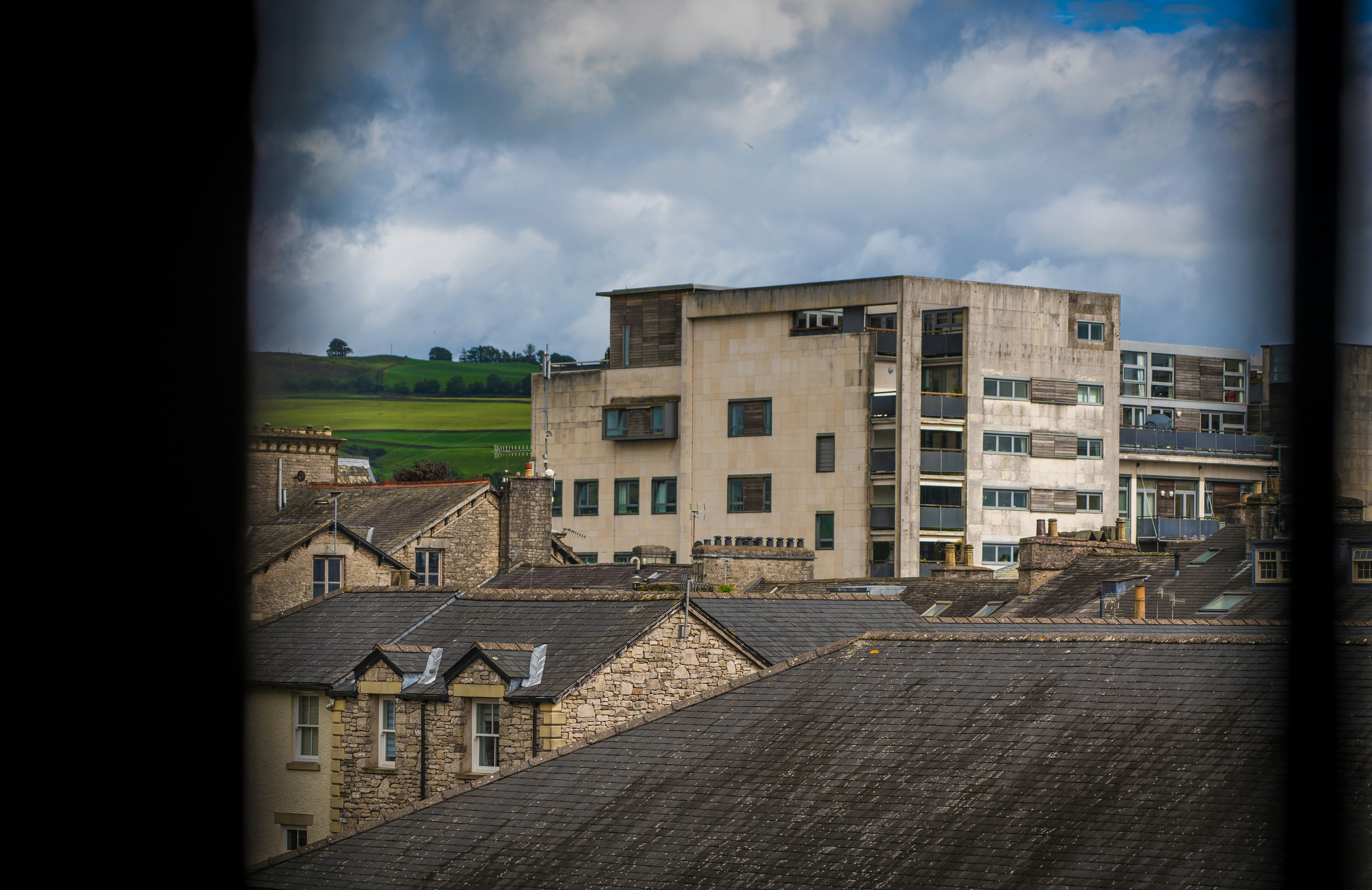 Rooftop Mosaic: Framing the Quiet Horizon Between Stone and Concrete