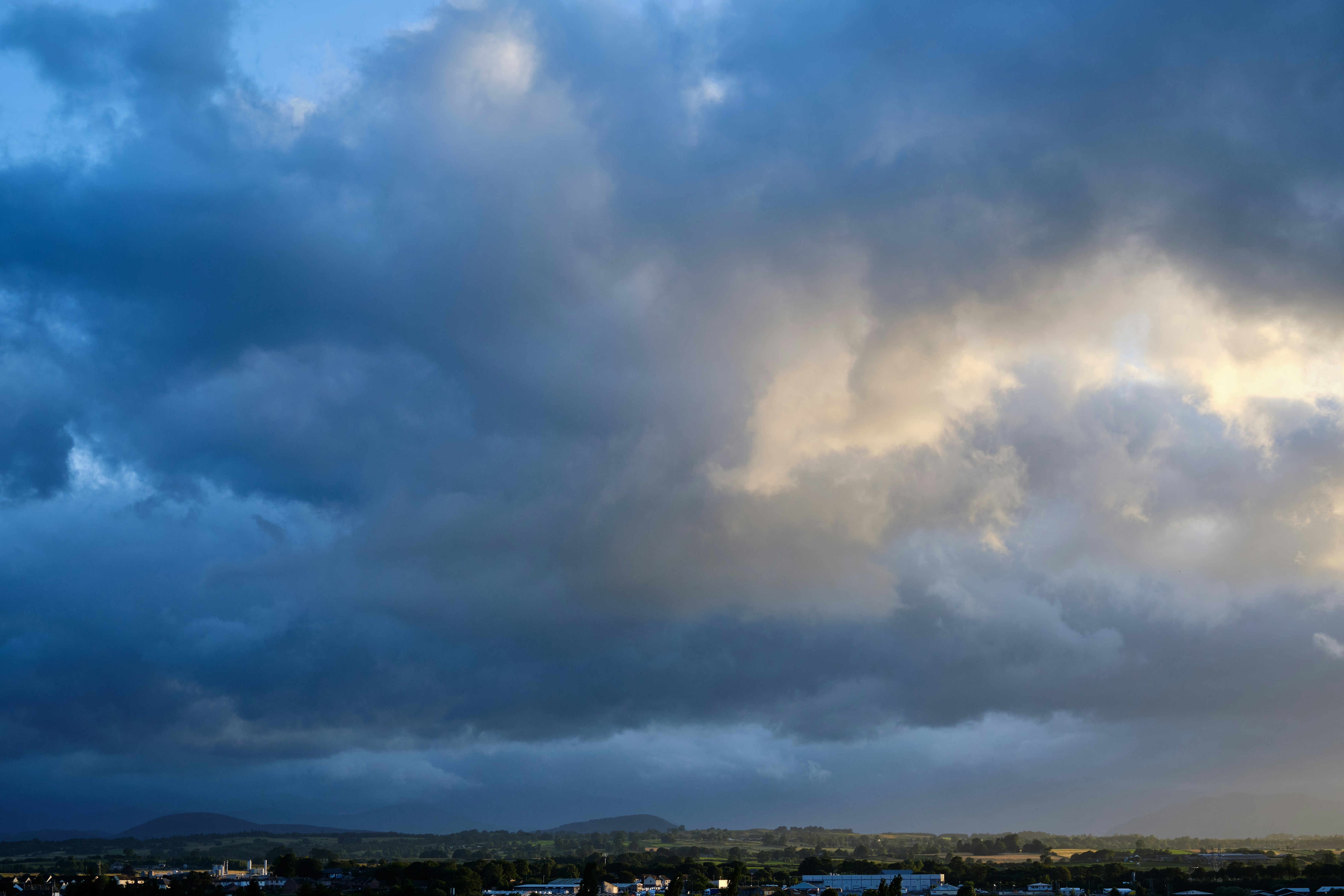 Low Horizon Sky Drama Over a Quiet Town