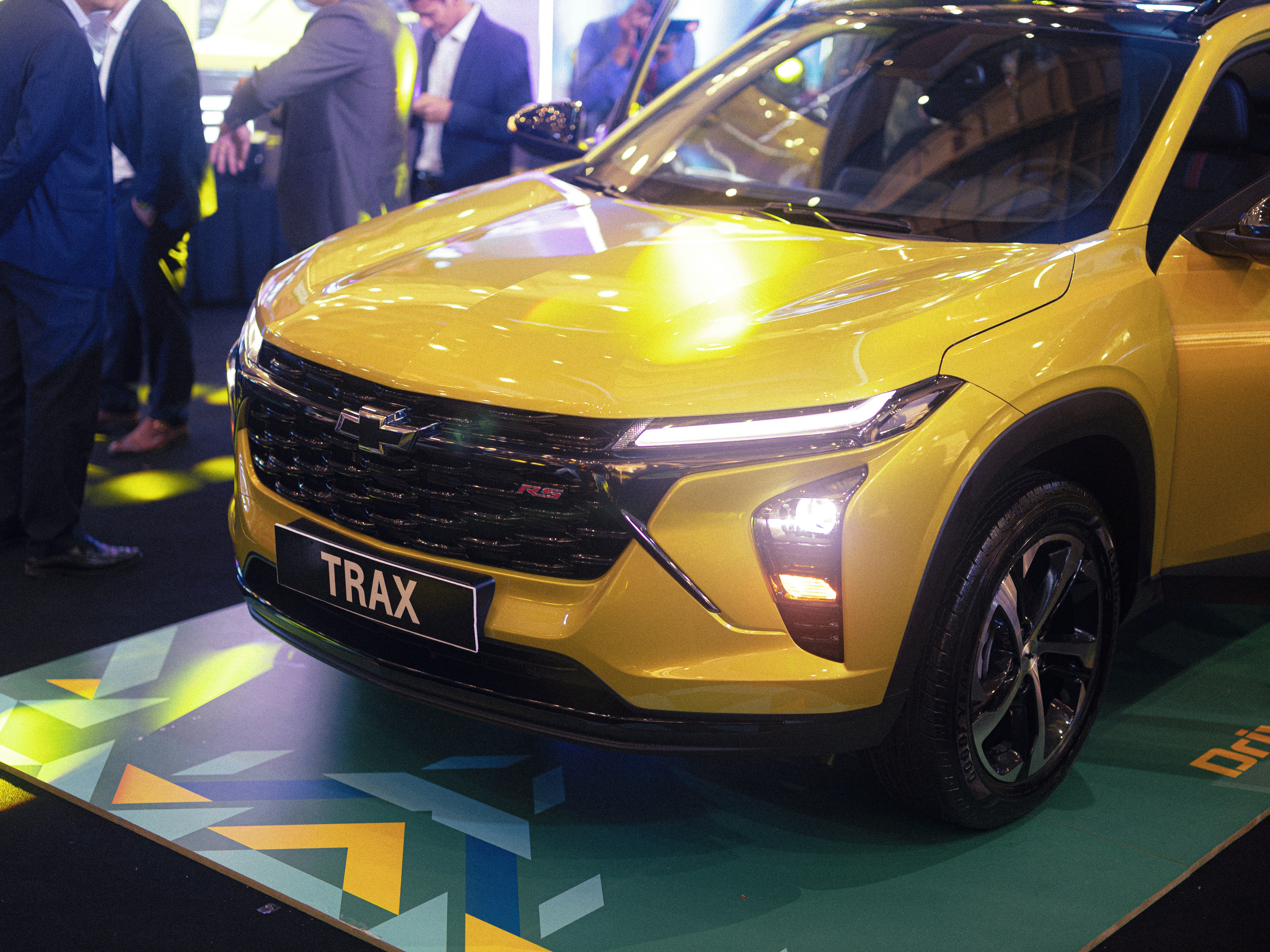 A yellow suv is on display at a car show photo – Free Spoke Image on ...