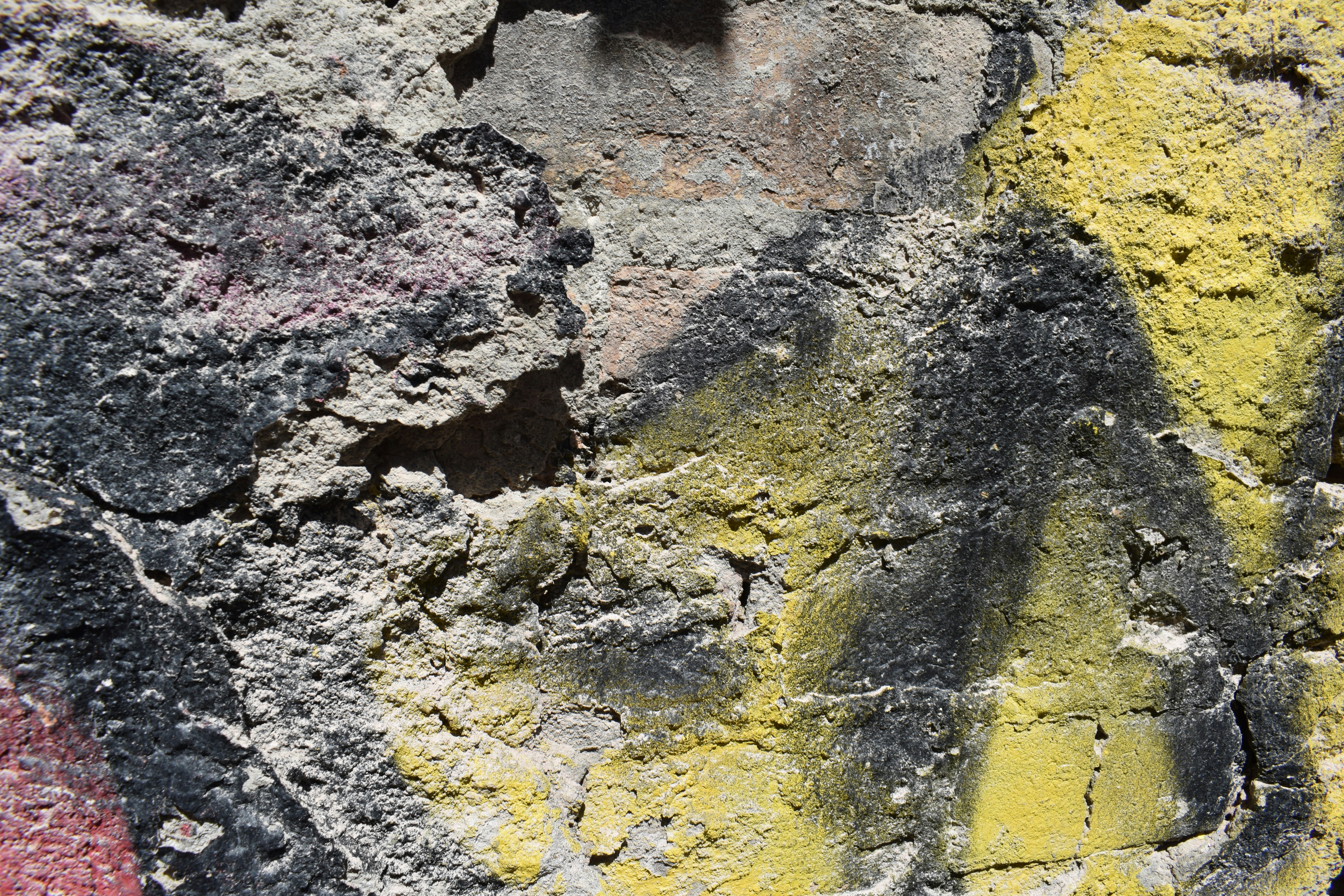 Yellow Echoes on a Weathered Concrete Canvas