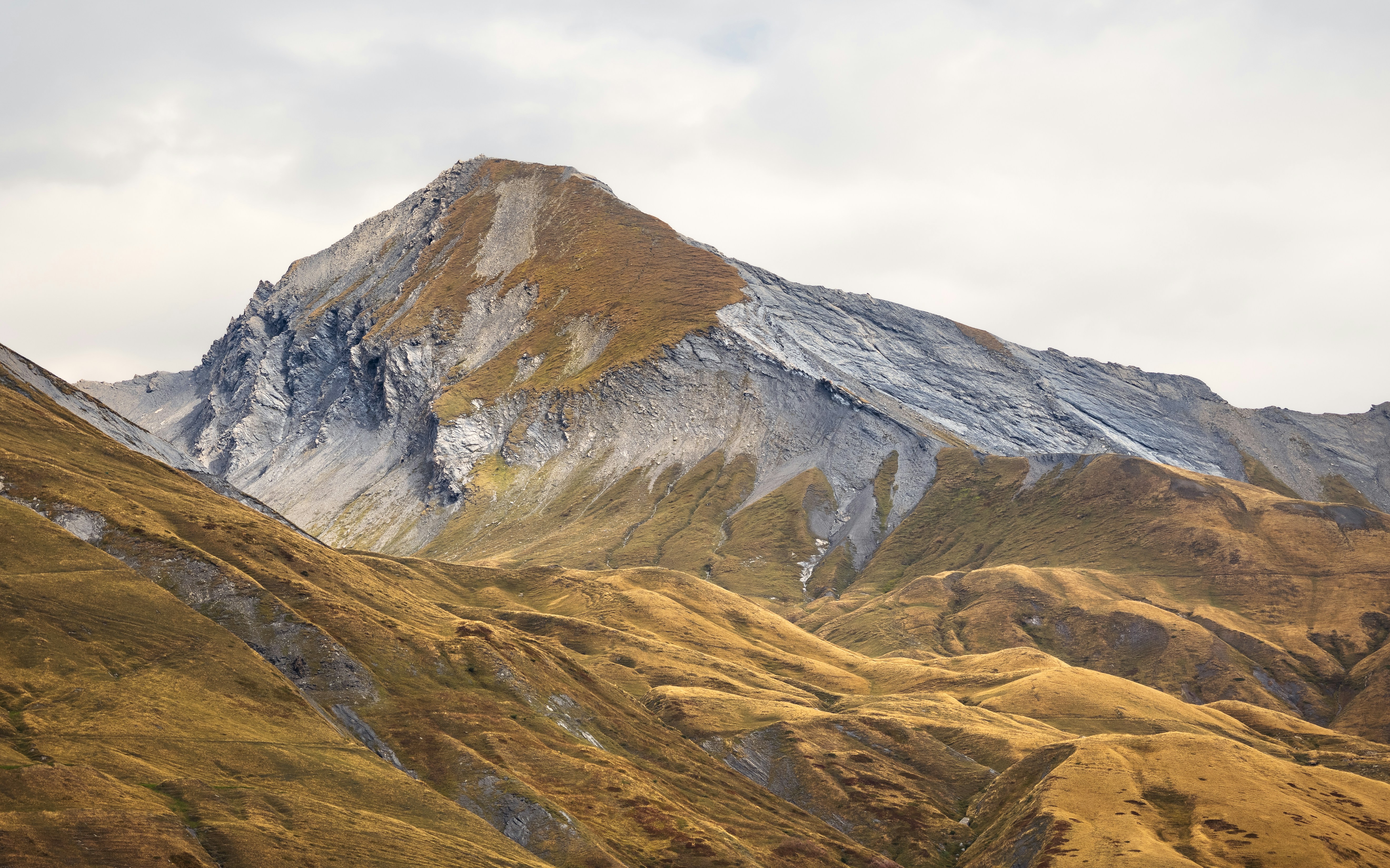 A large mountain with a very tall peak photo – Free Great st bernard ...