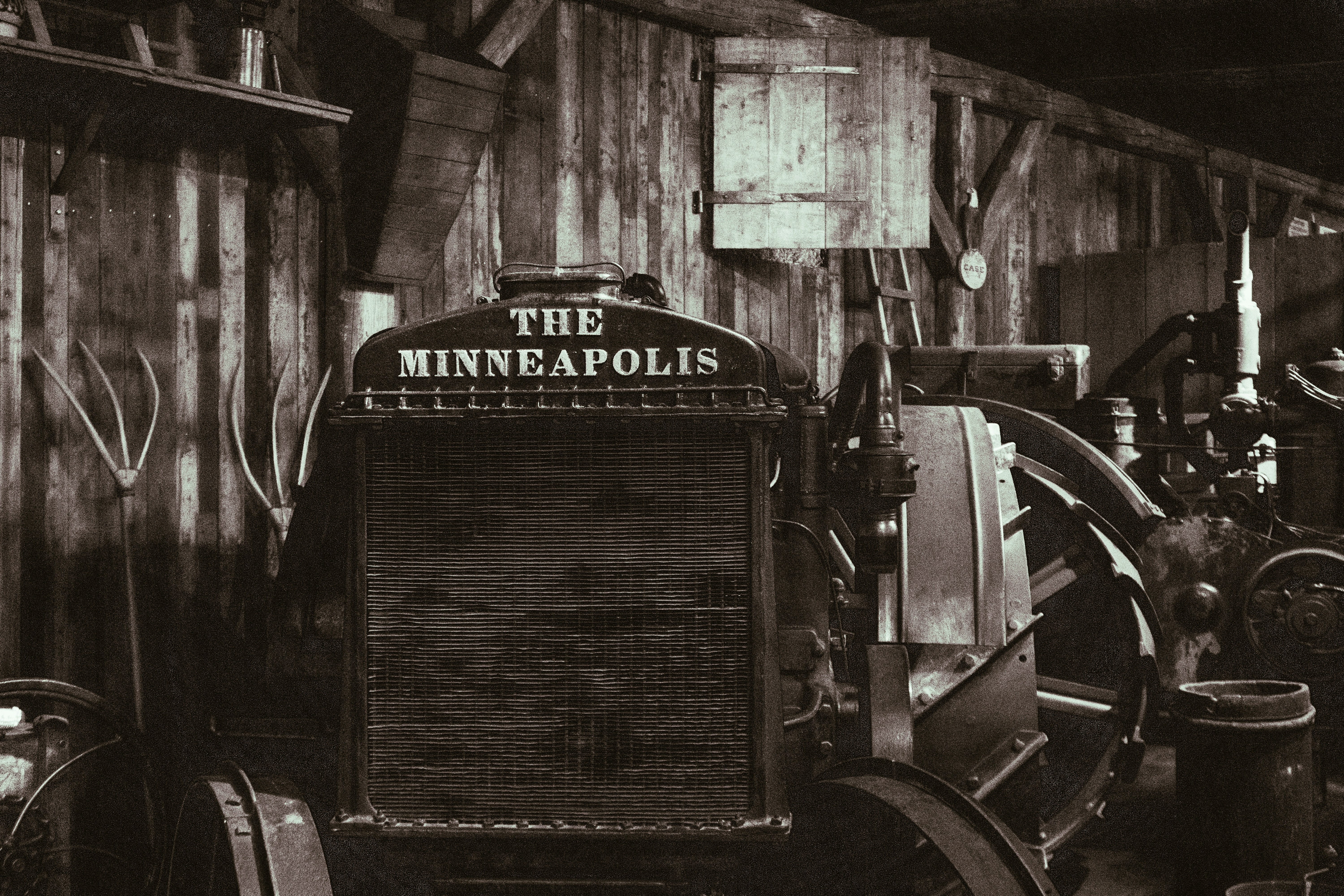 The Minneapolis Engine: Vintage Tractor in a Dusty Workshop