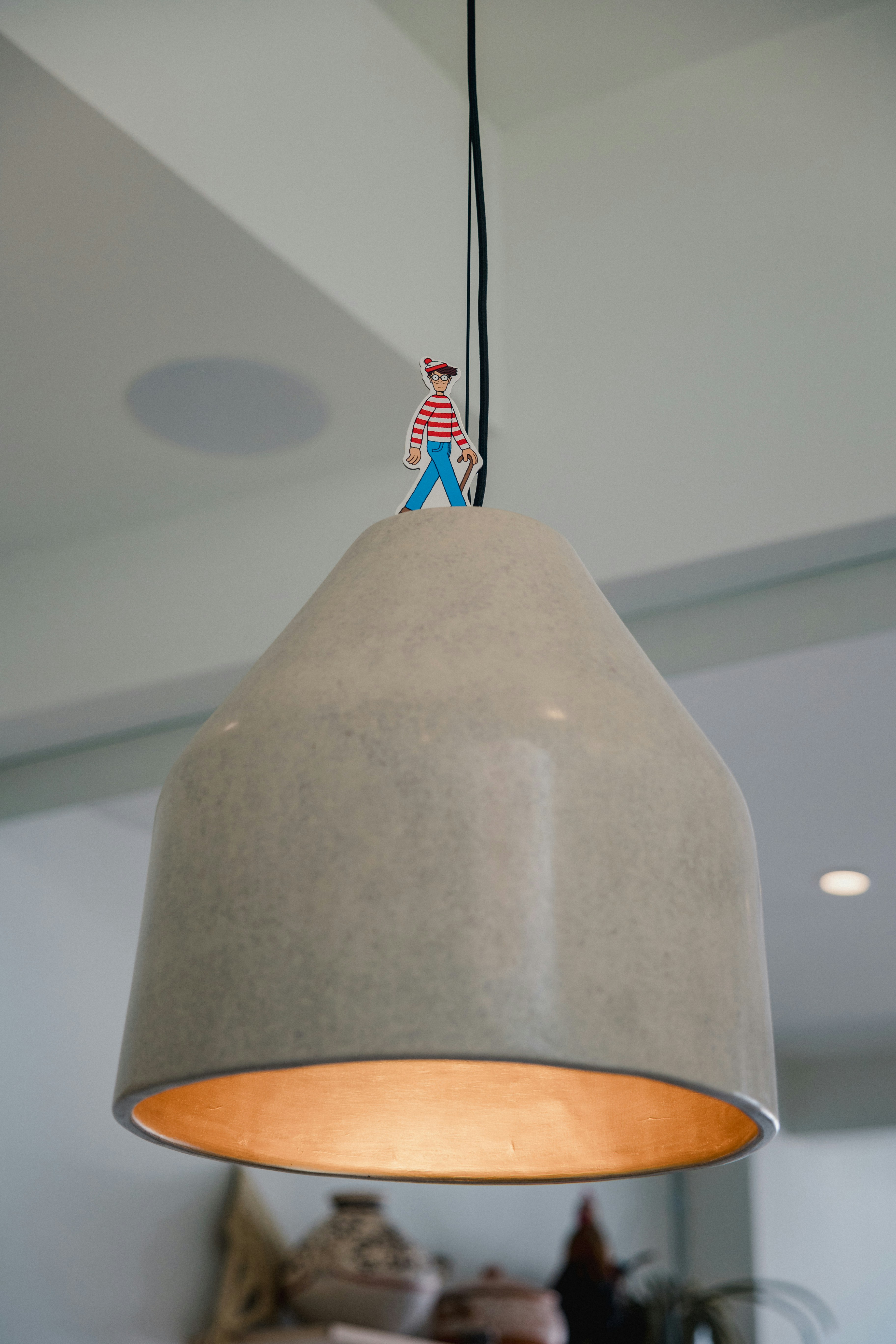 Tiny Sailor Guards the Glow: A Figurine on a Concrete Pendant Lamp