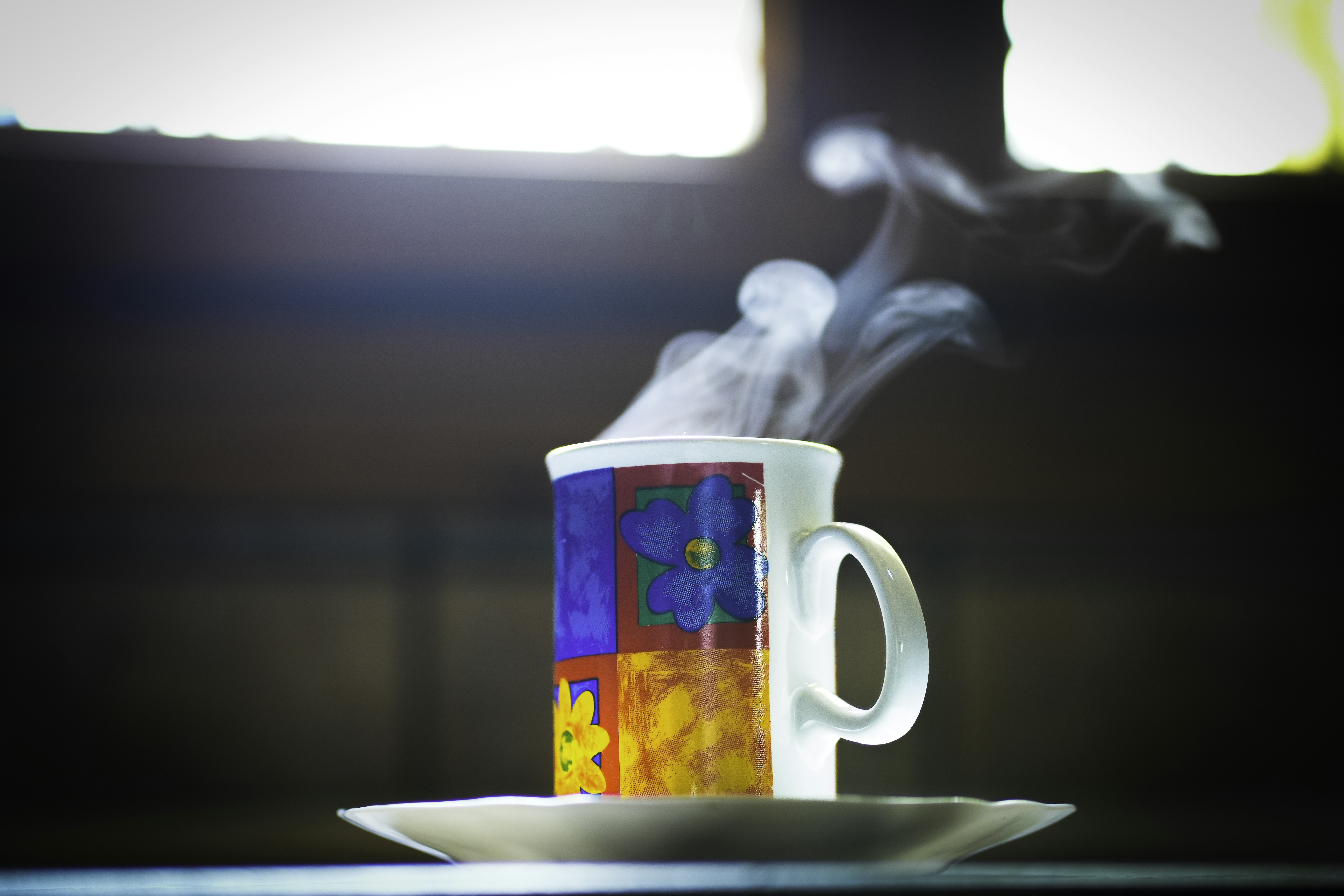 Steam over a Mosaic Mug: Quiet Morning Light on Colorful Ceramics