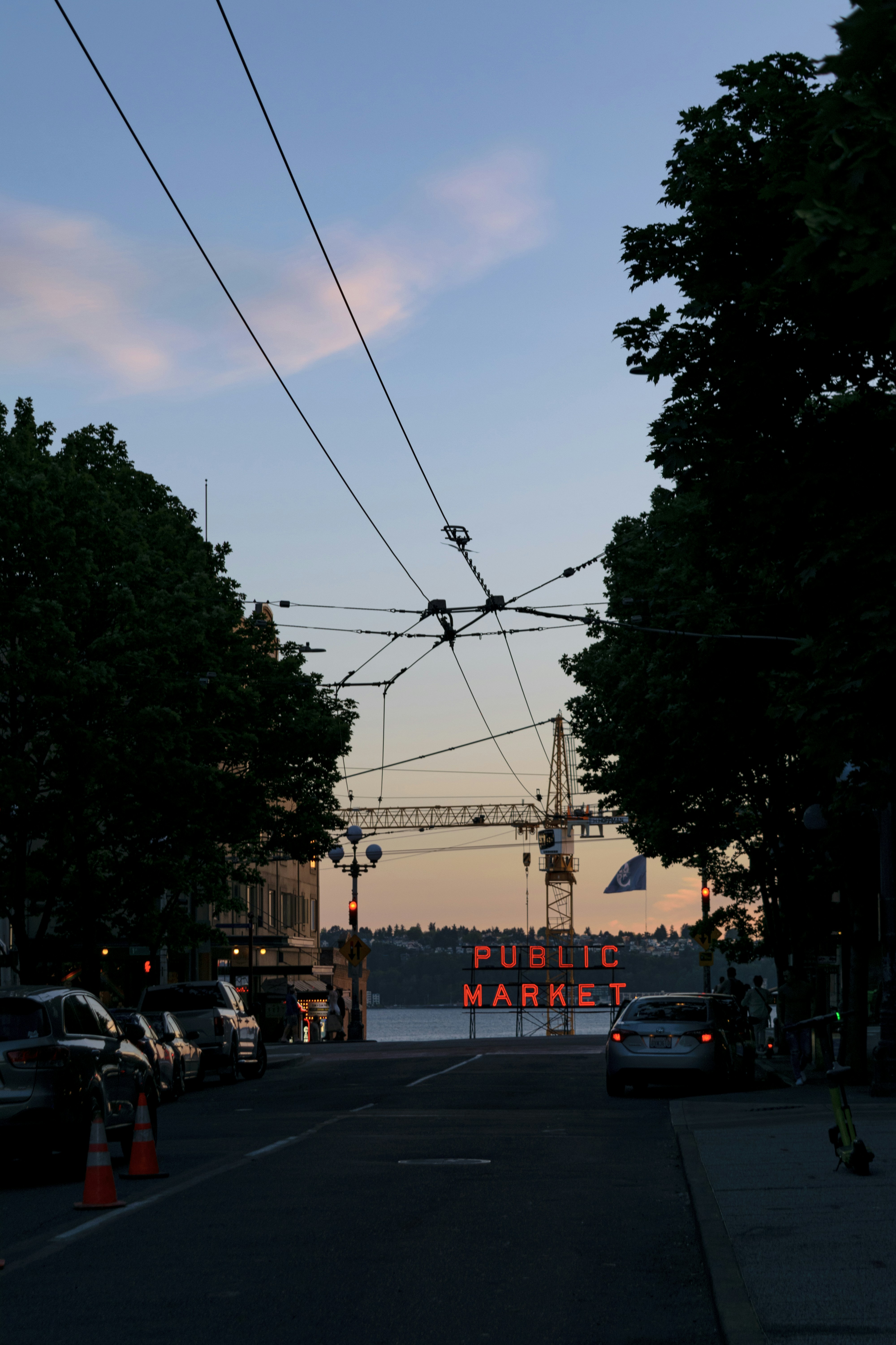 Sunset Convergence: Tram Wires Guiding the Path to the Public Market