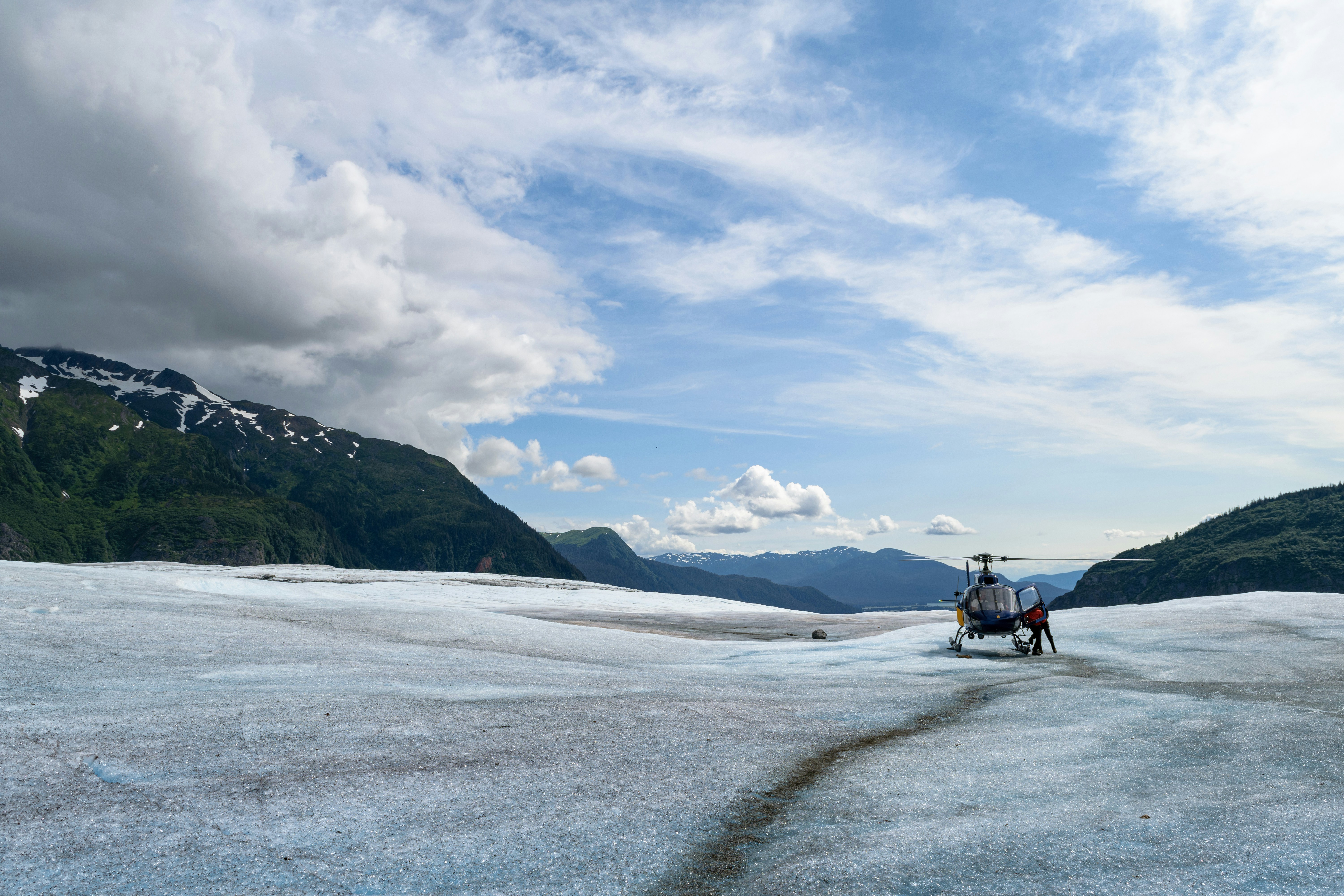 Glacier Traverse: A Snowfield Trekker Reaches the Tarmac of Ice