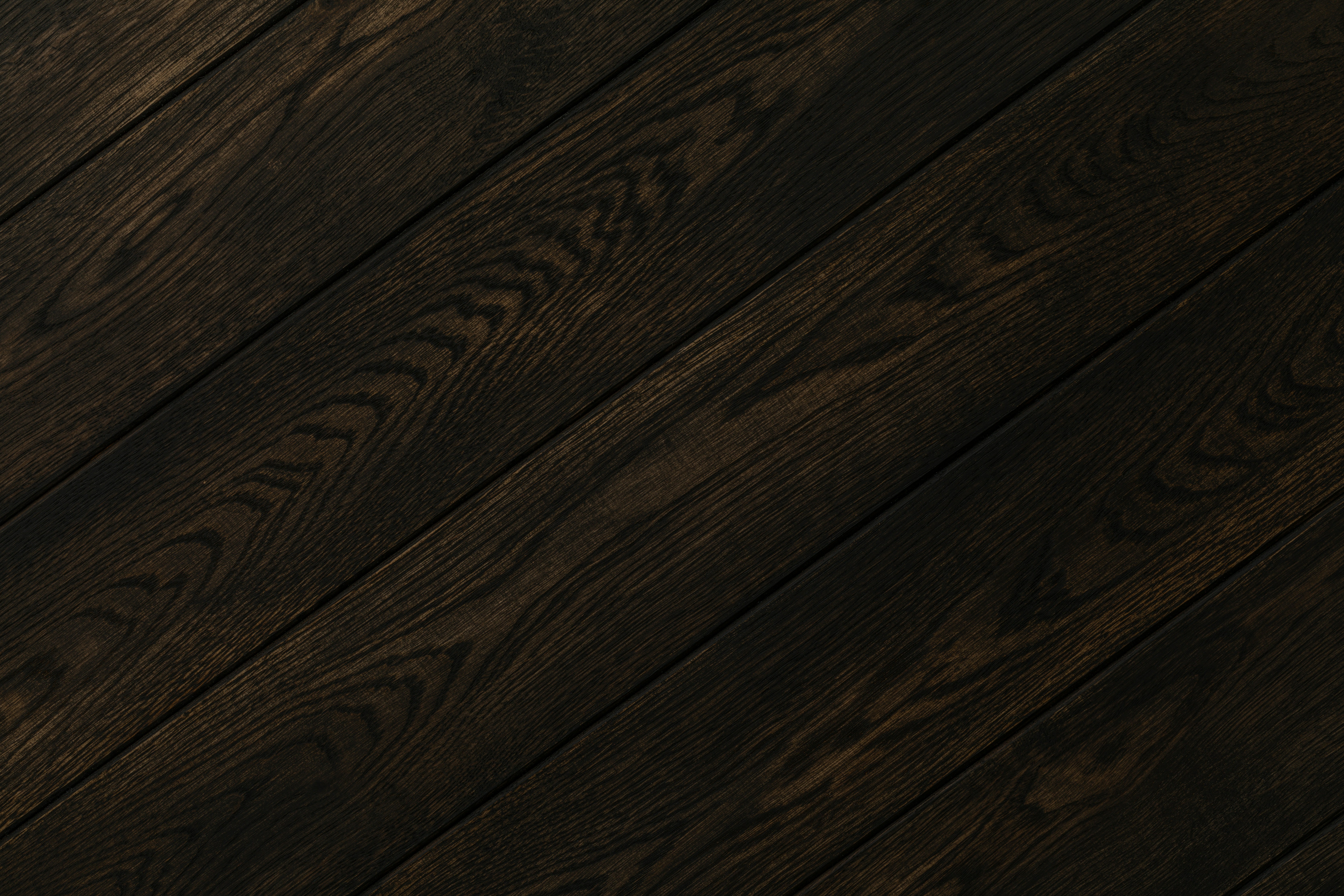 A close up of a wooden floor with dark stain photo – Free Wood Image on ...