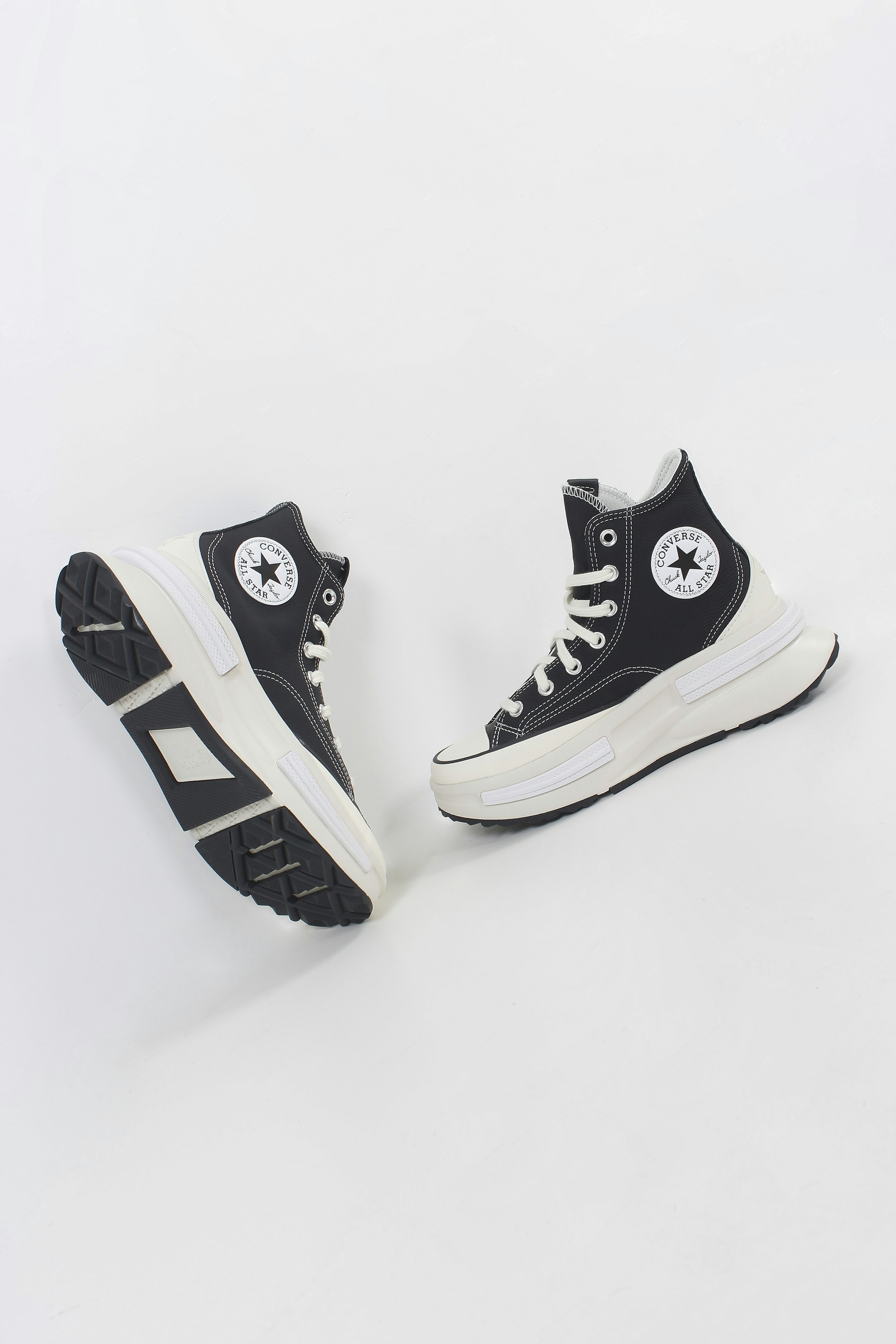 Converse Duo on a Clean White Stage