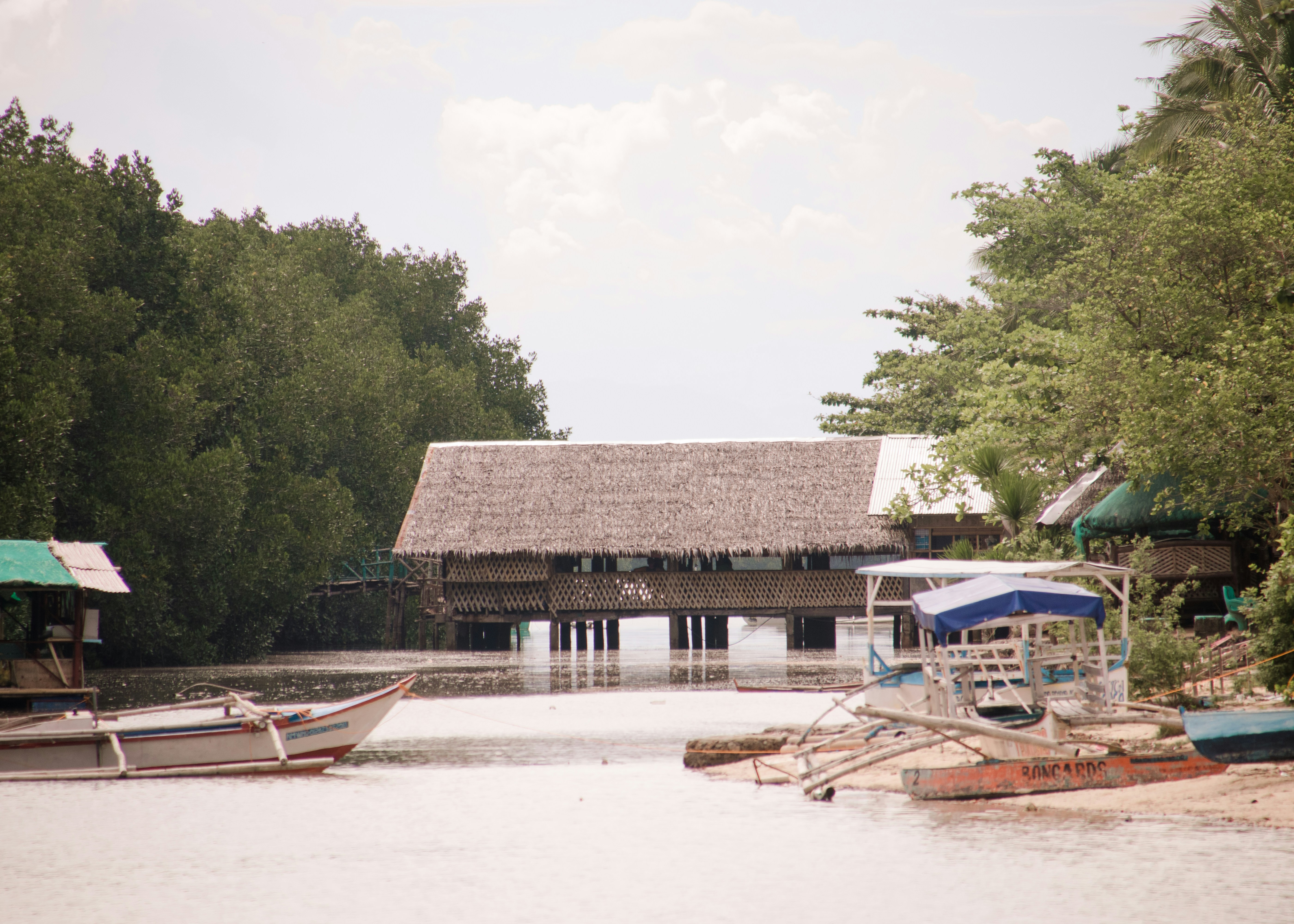 Thatched Haven on a Quiet Riverside