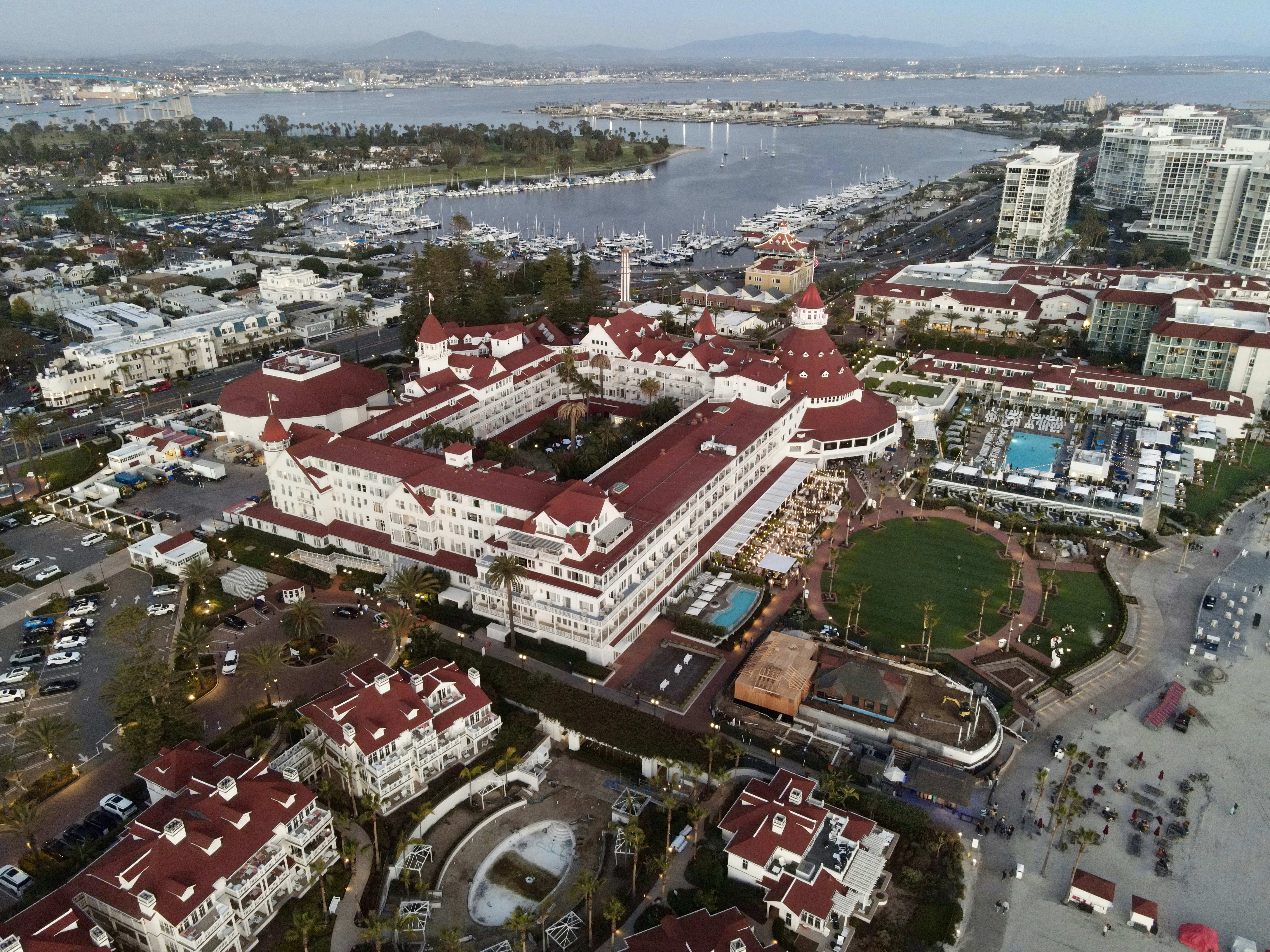 An aerial view of a large white building photo – Free Beach Image on ...
