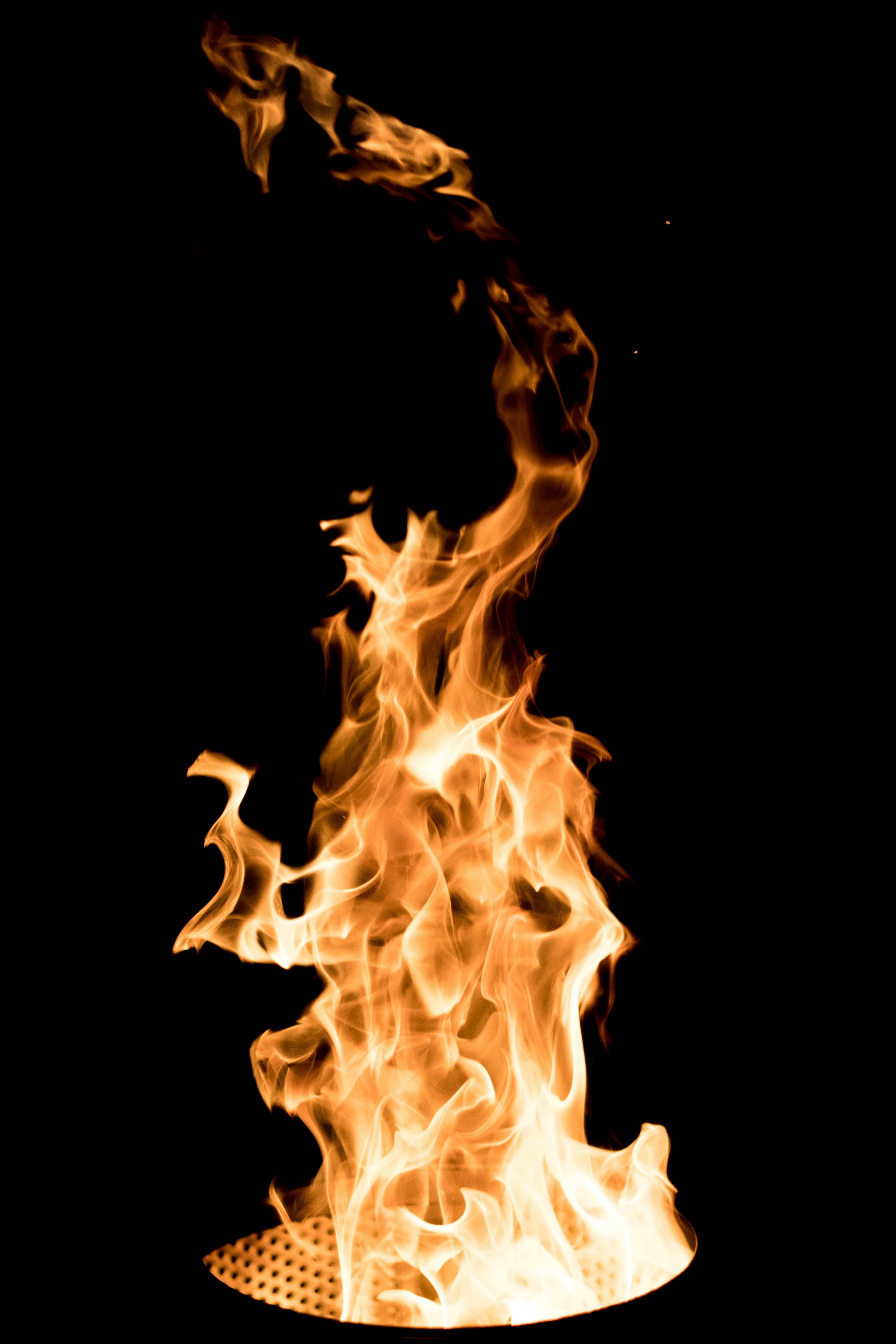 A close up of a fire on a black background photo – Free Fire Image on ...