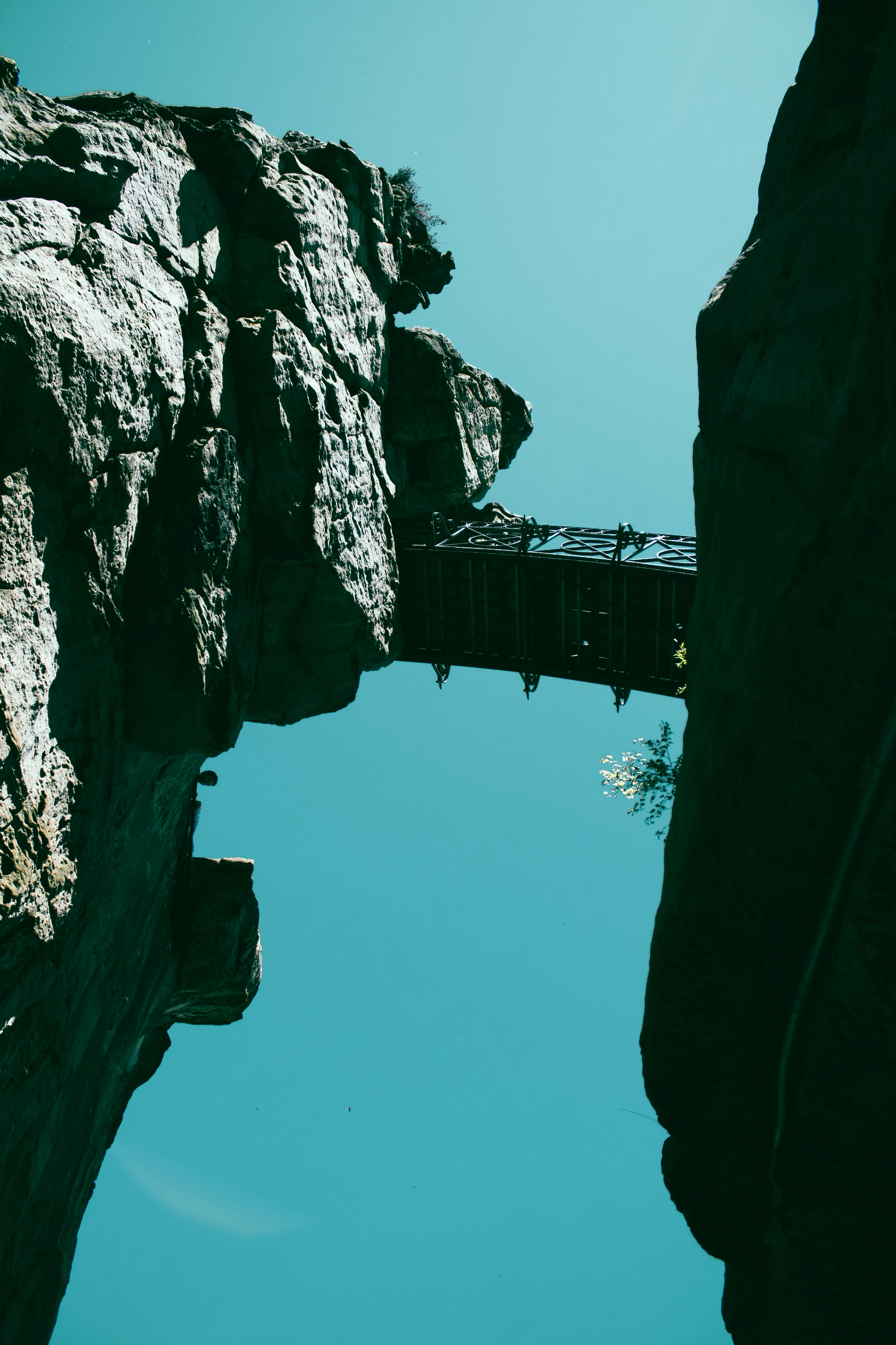 A Thin Steel Span Between Towering Granite Cliffs