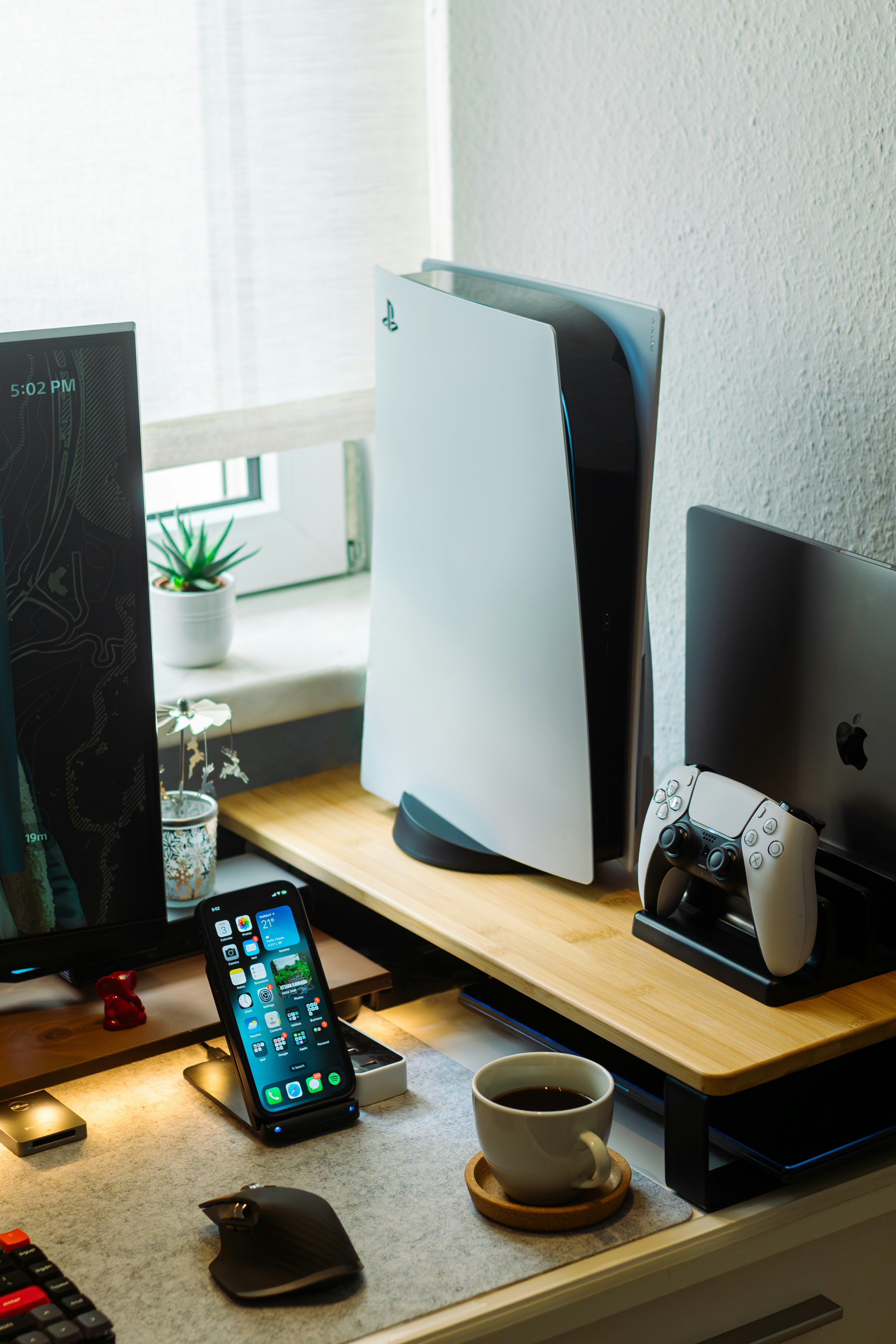 A desk with a cell phone, computer monitor, keyboard and mouse photo ...