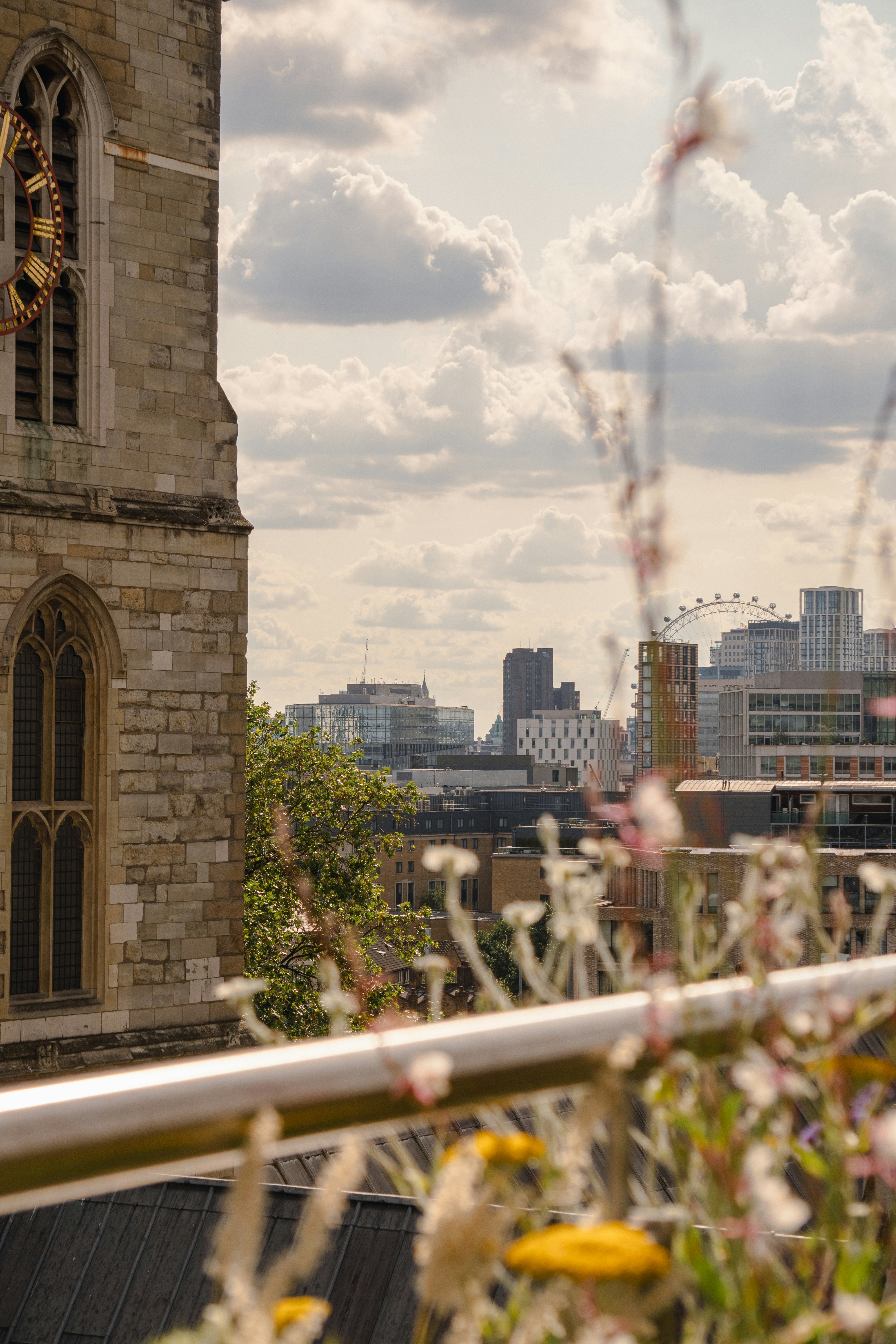 A view of a clock tower from a rooftop photo – Free Image on Unsplash