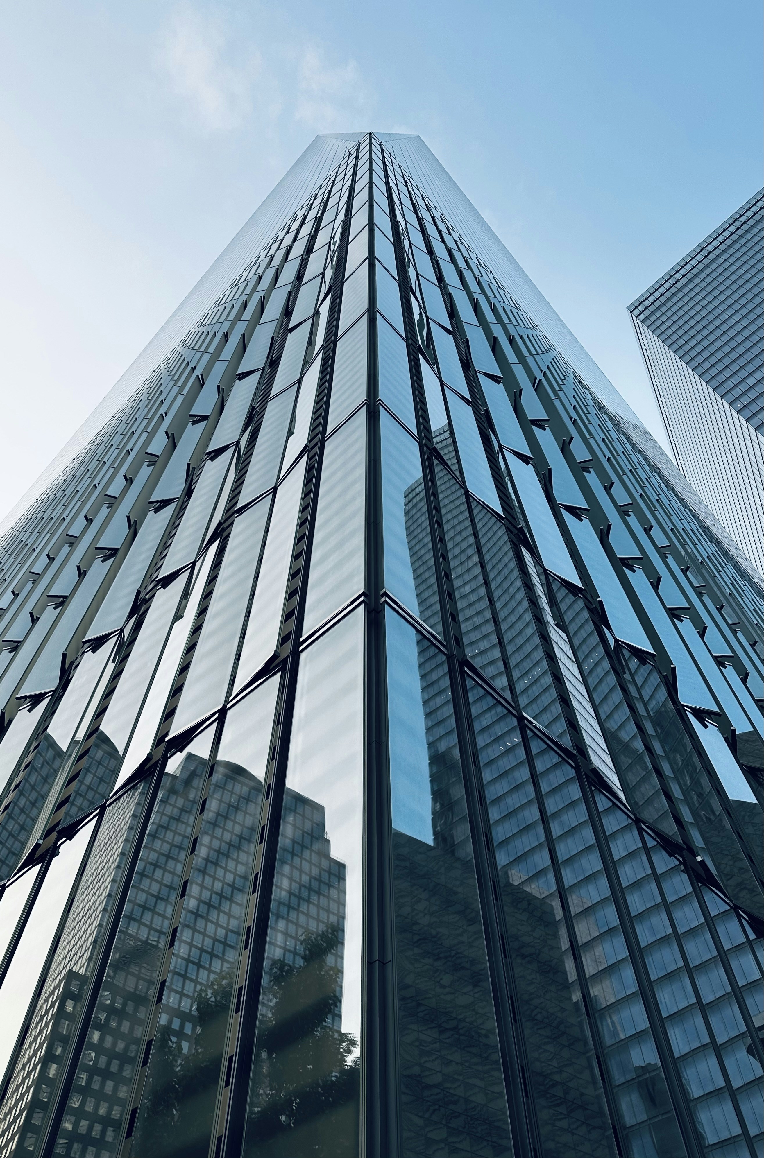 A very tall building with a lot of windows photo – Free Image on Unsplash