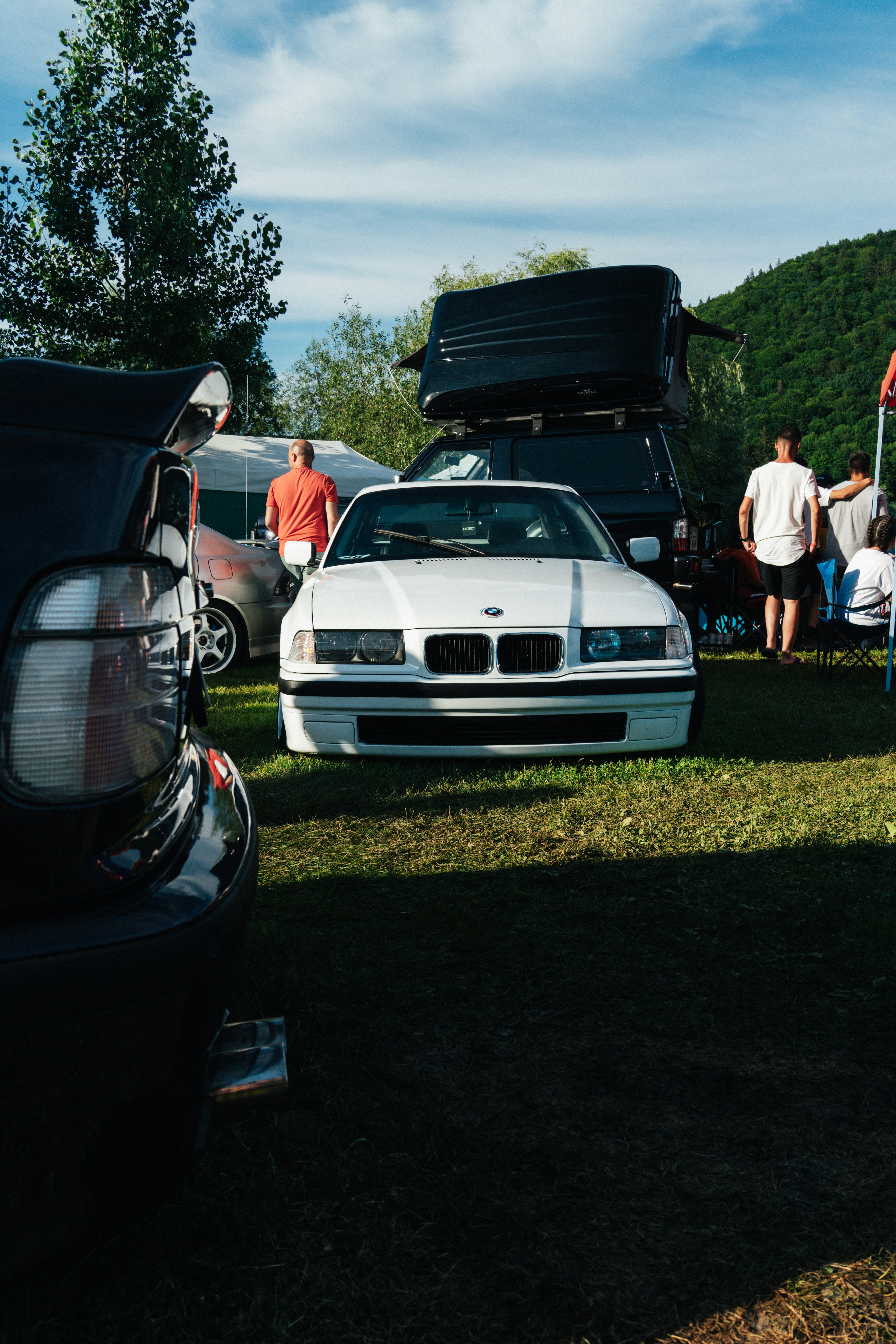 White BMW Rendezvous at a Sunny Car Meet