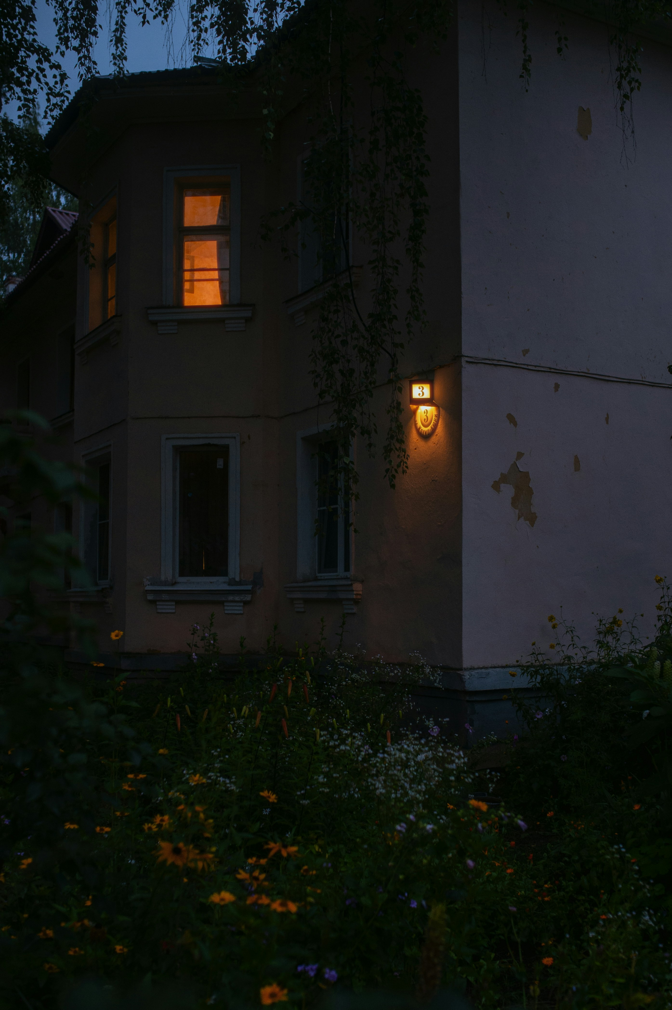 A house with a light on at night photo – Free Window Image on Unsplash