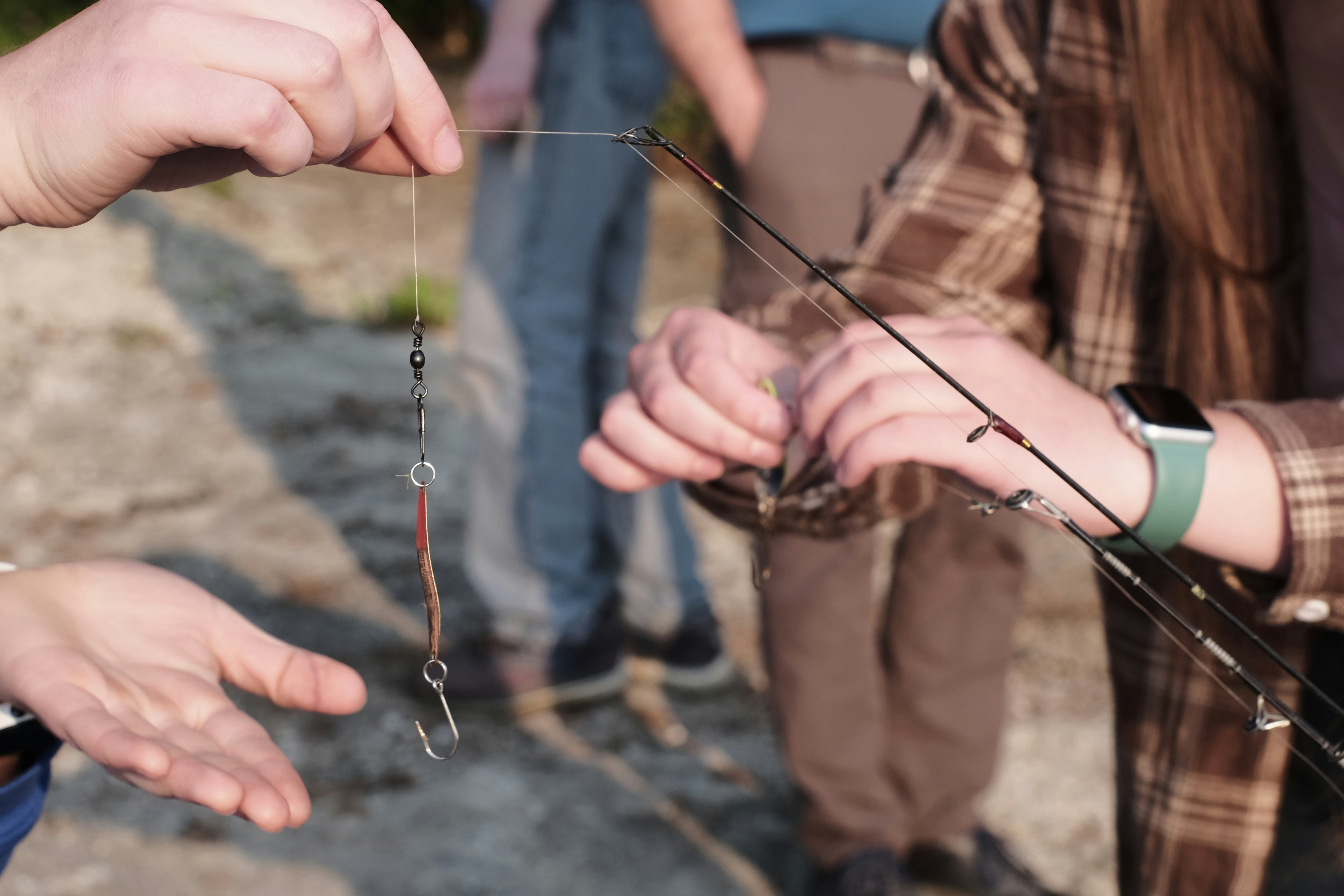 Caught in the Release: A Slow-Wlight Moment of a Handful of Fishing Line