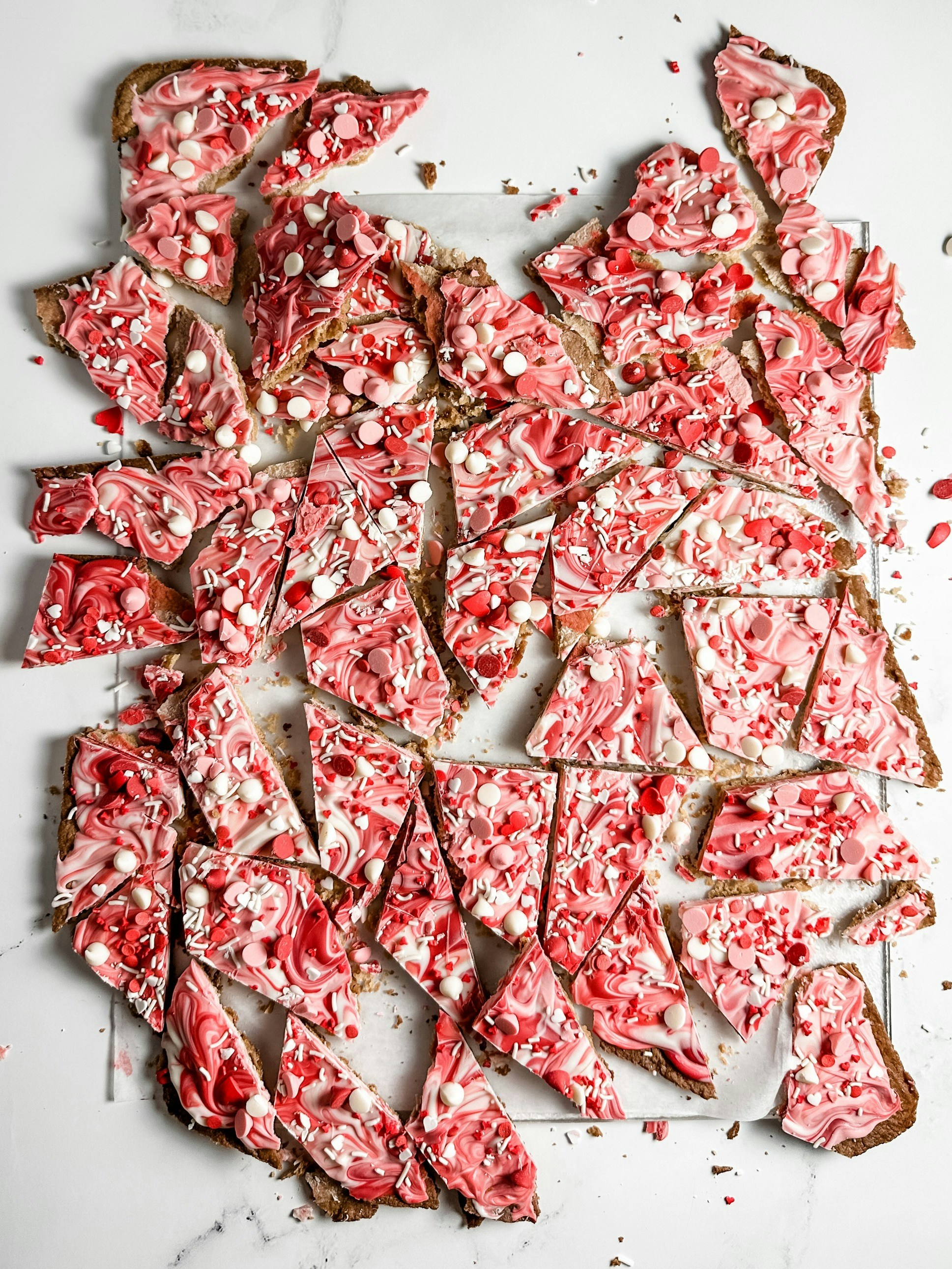 Rosy Marble Toast Fragments on a White Canvas