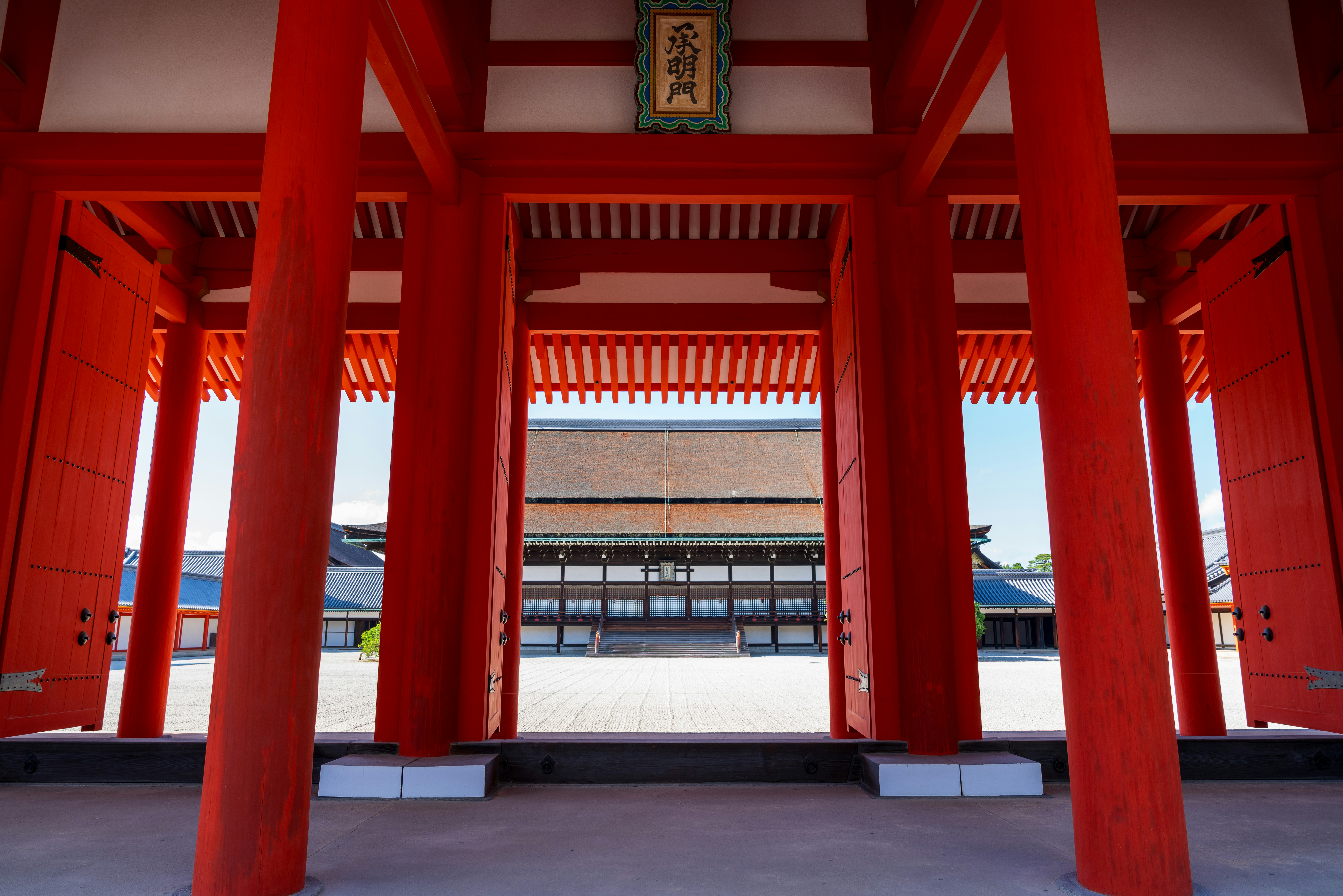 A couple of red pillars in front of a building photo – Free Kyoto Image ...