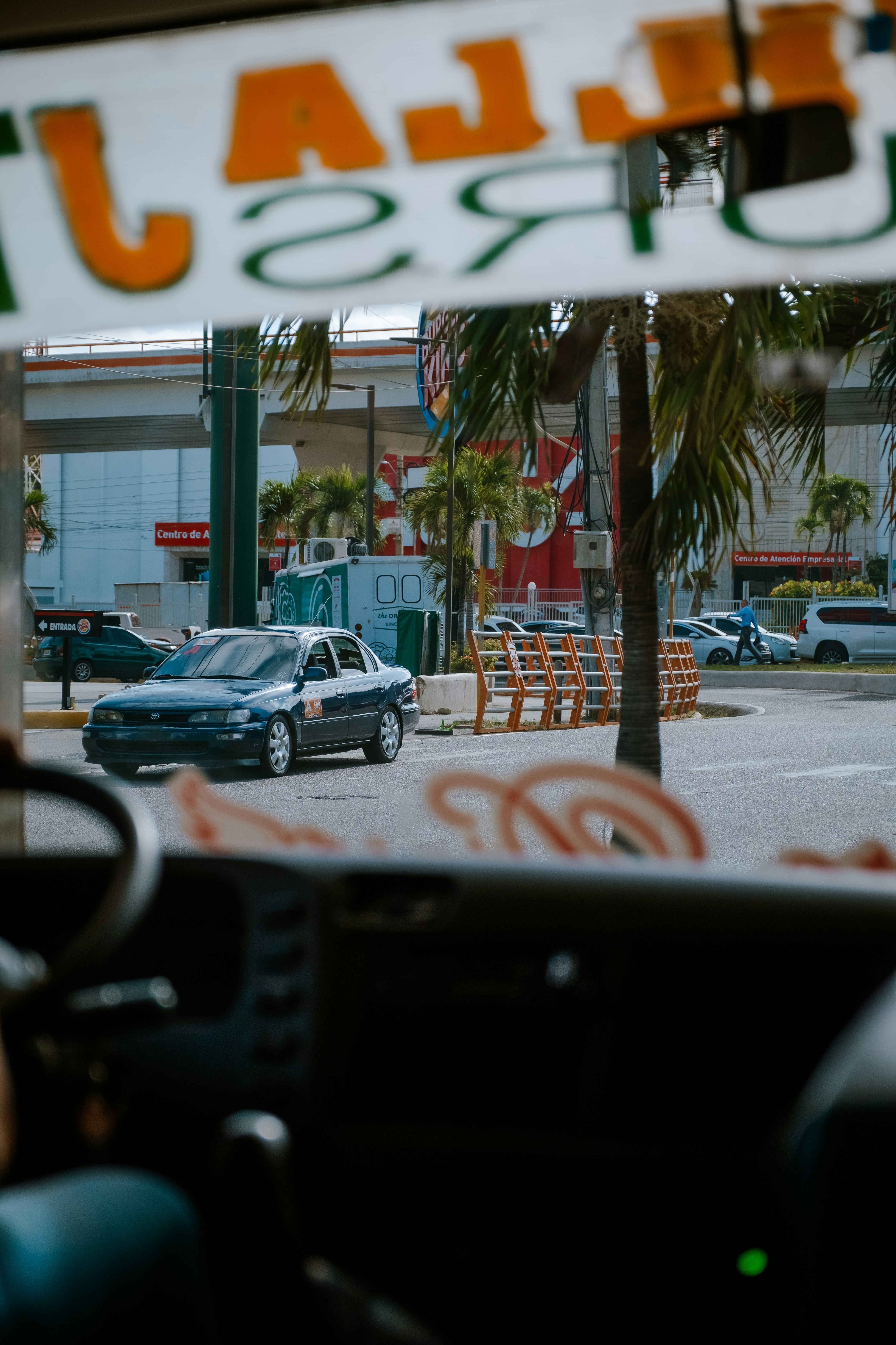 Framed Street Scene Through a Car Window