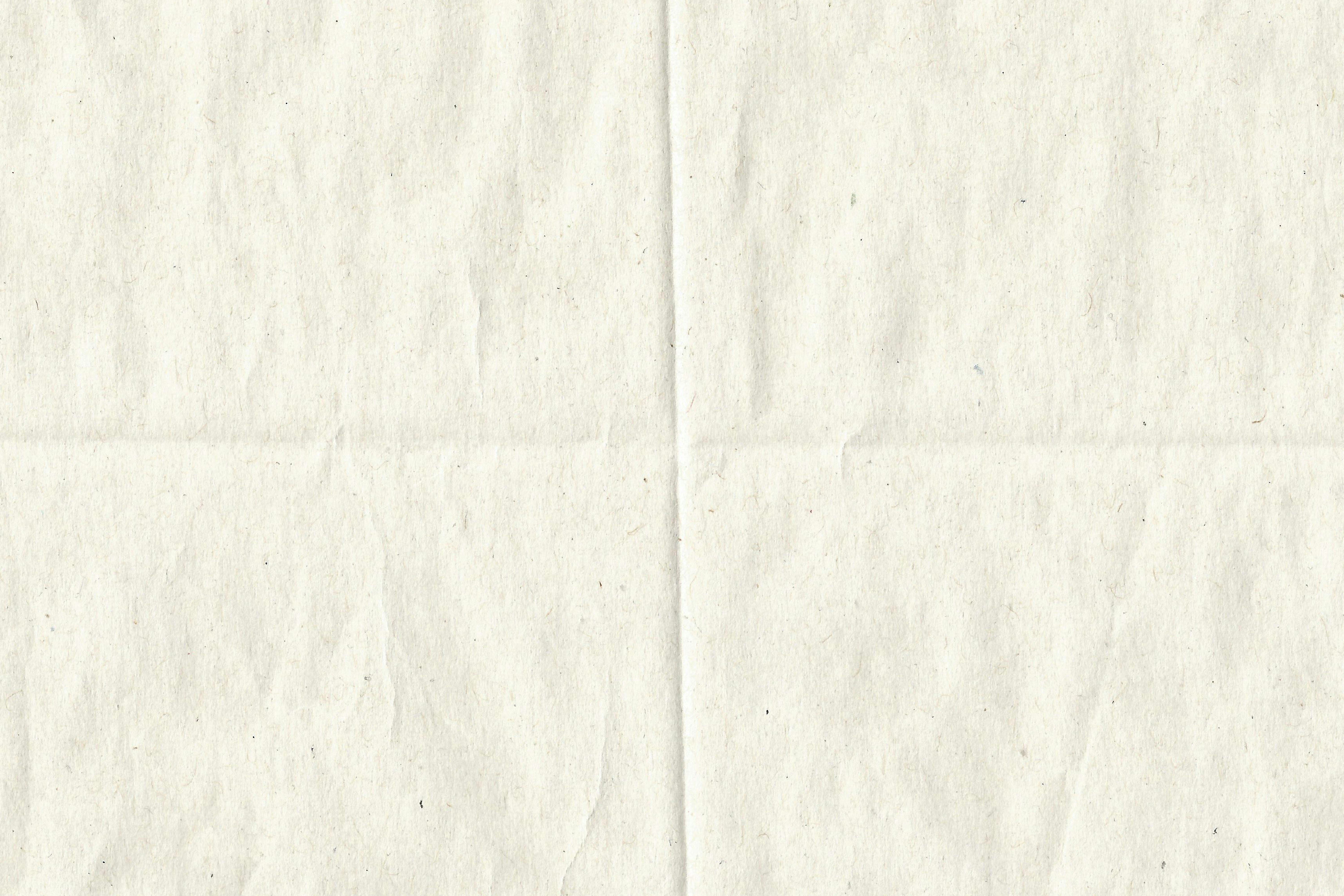 A piece of white paper that has been folded photo – Free Paper Image on ...