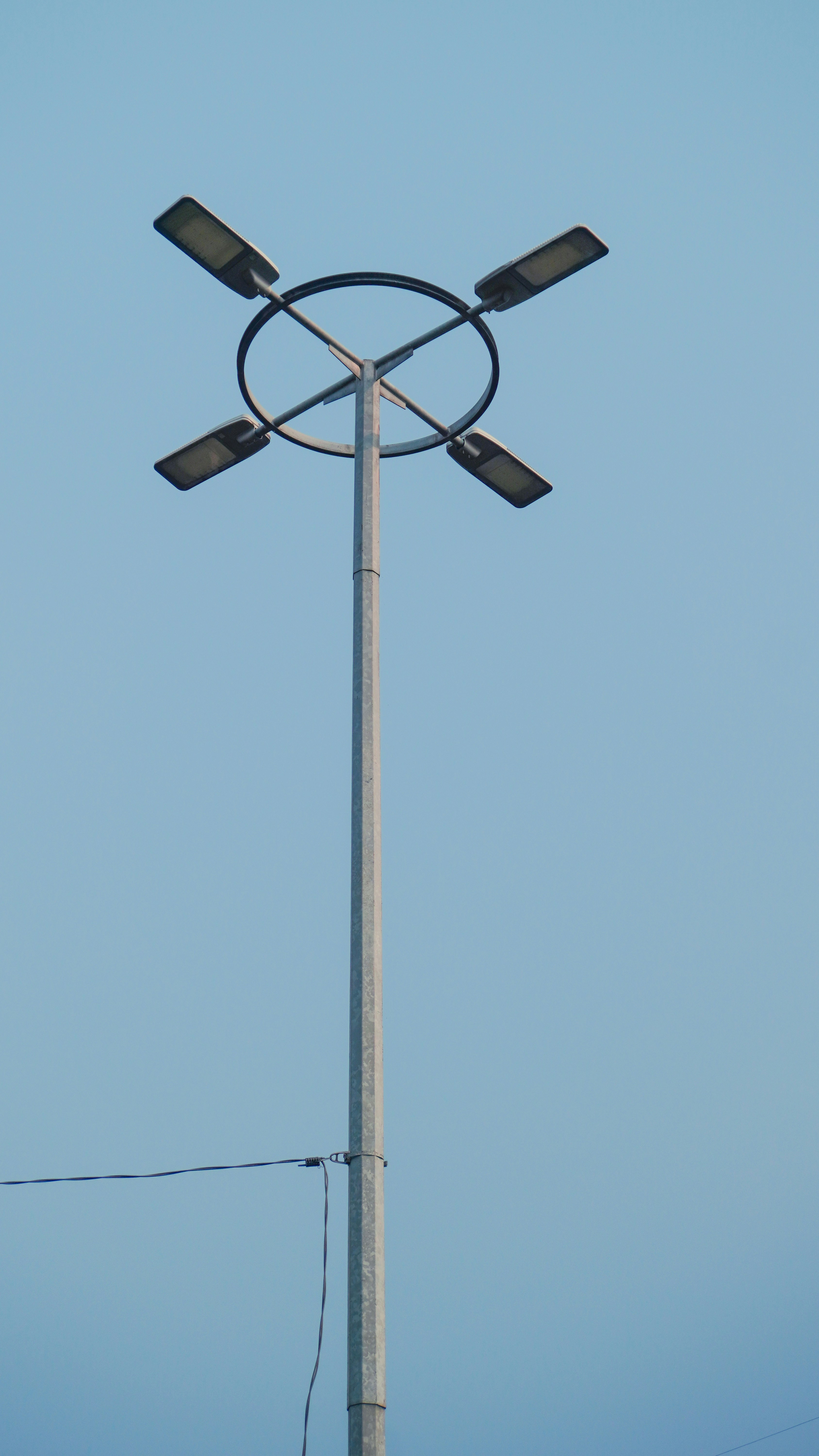A pole with three lights on top of it photo – Free Electricity Image on ...