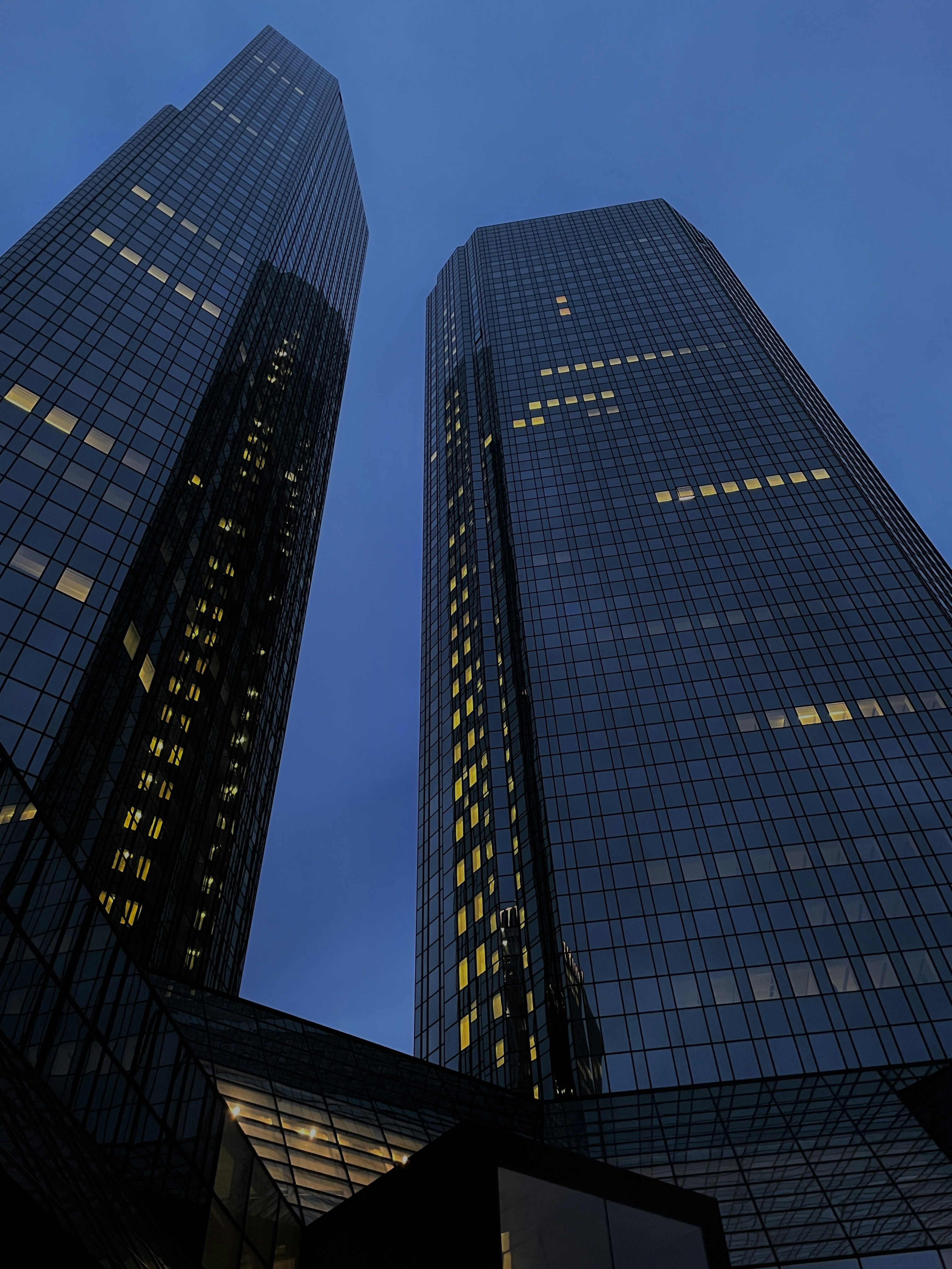 Two very tall buildings that are next to each other photo – Free ...