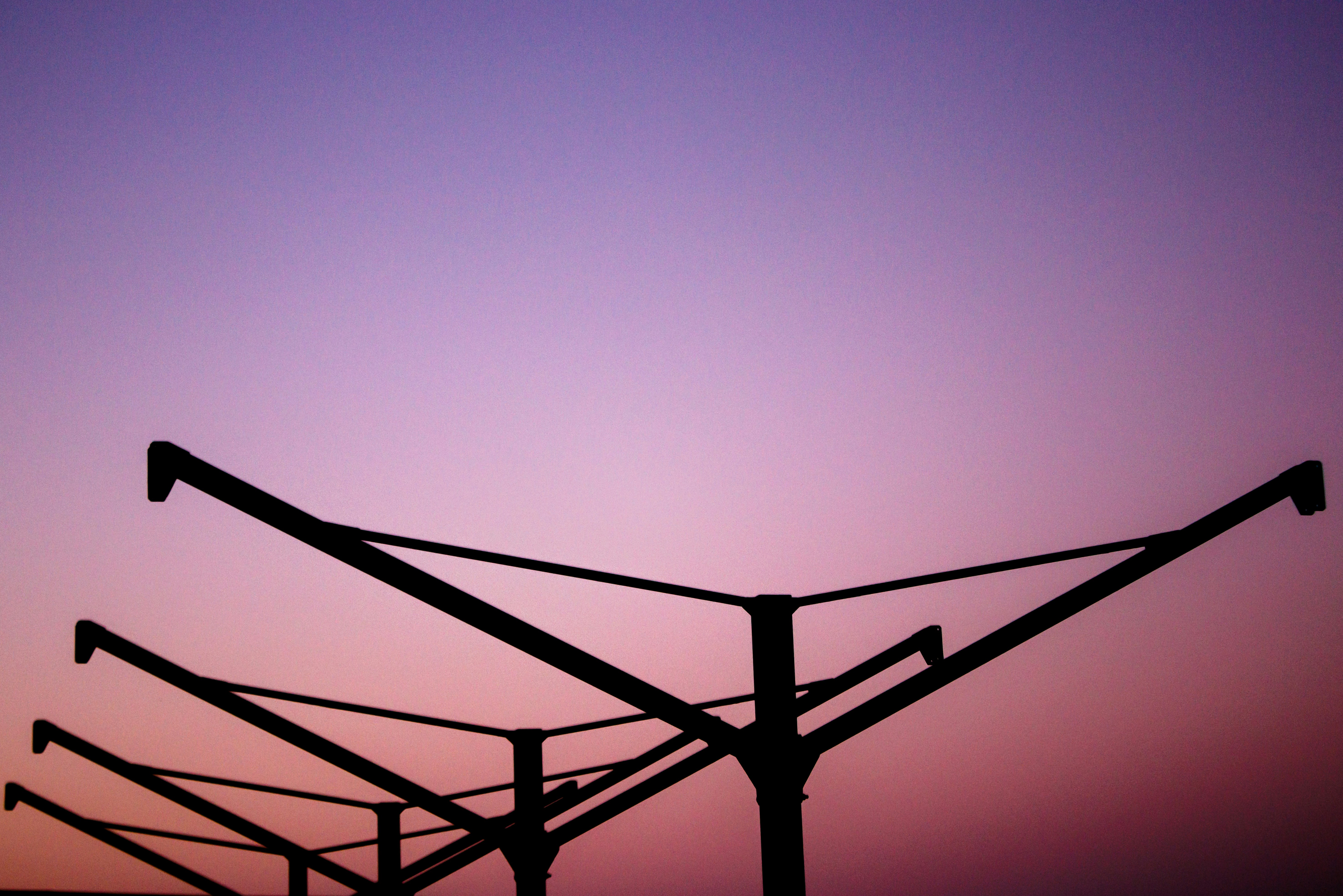 Silhouetted Trestles Against a Blushing Dusk