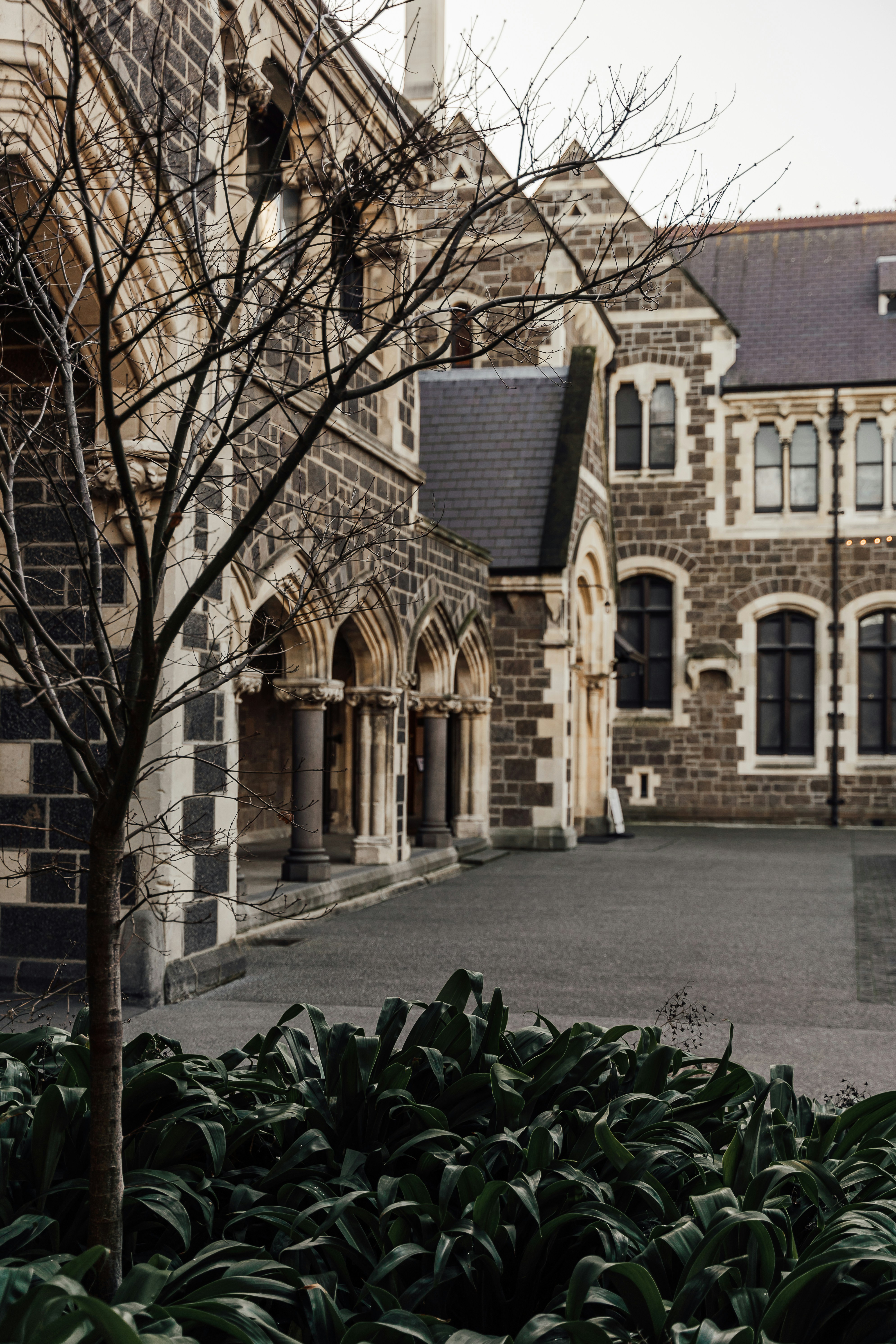 Stone Arcades, Quiet Geometry: A Courtyard Portrait
