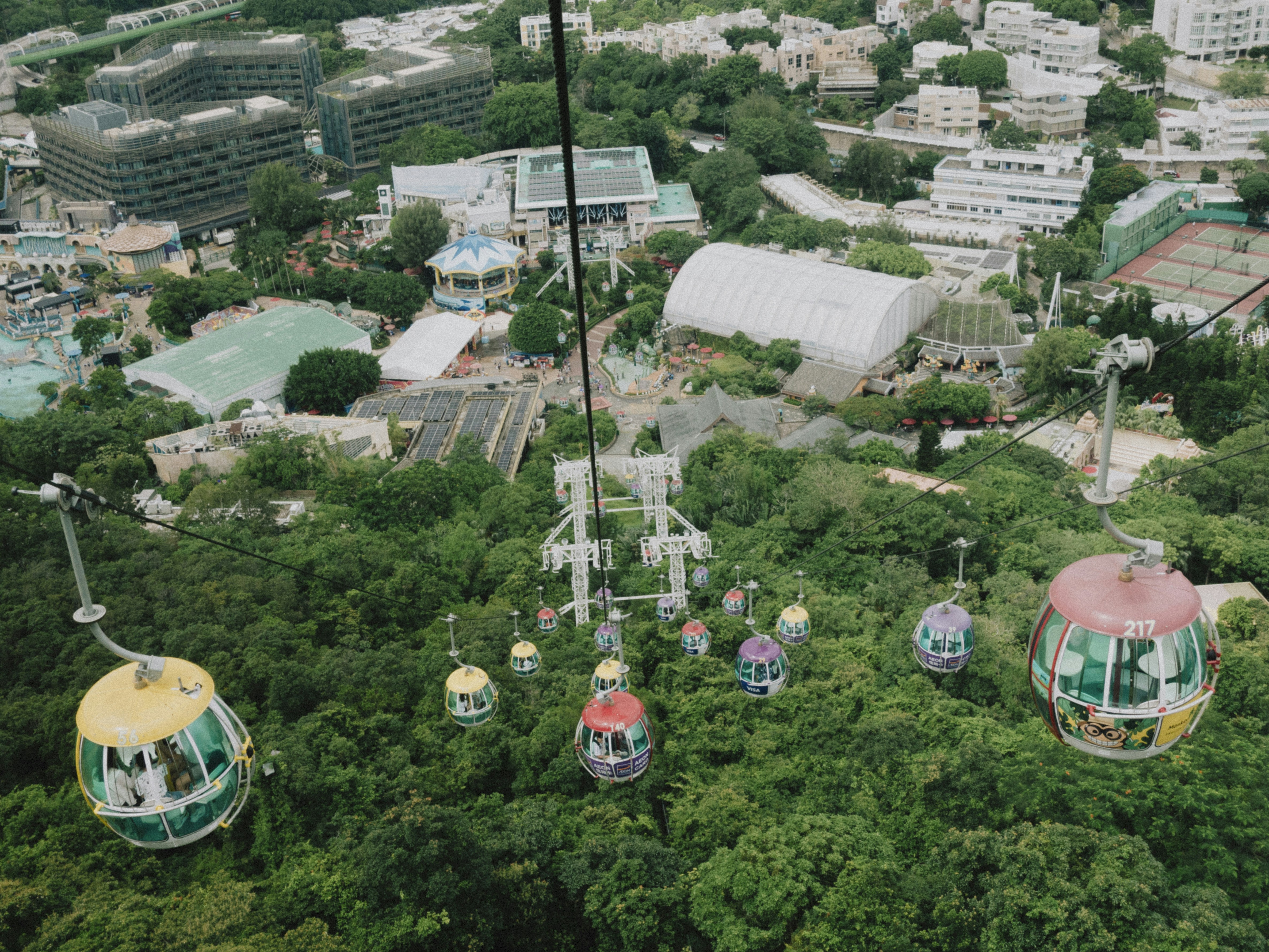 Gondola Carousel Above a Verdant Ridge