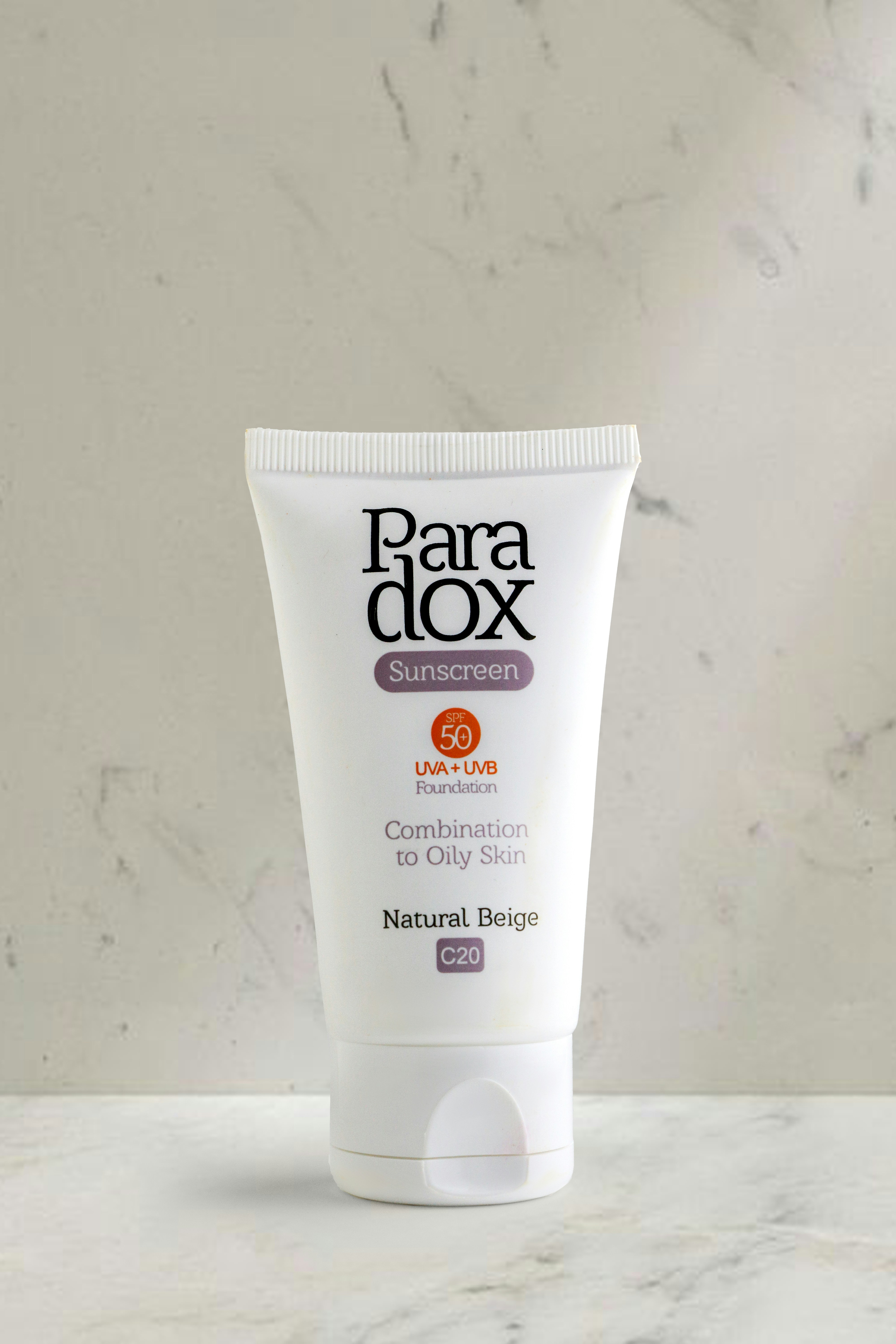 A tube of para dox on a marble counter photo – Free 3d wallpaper Image on Unsplash