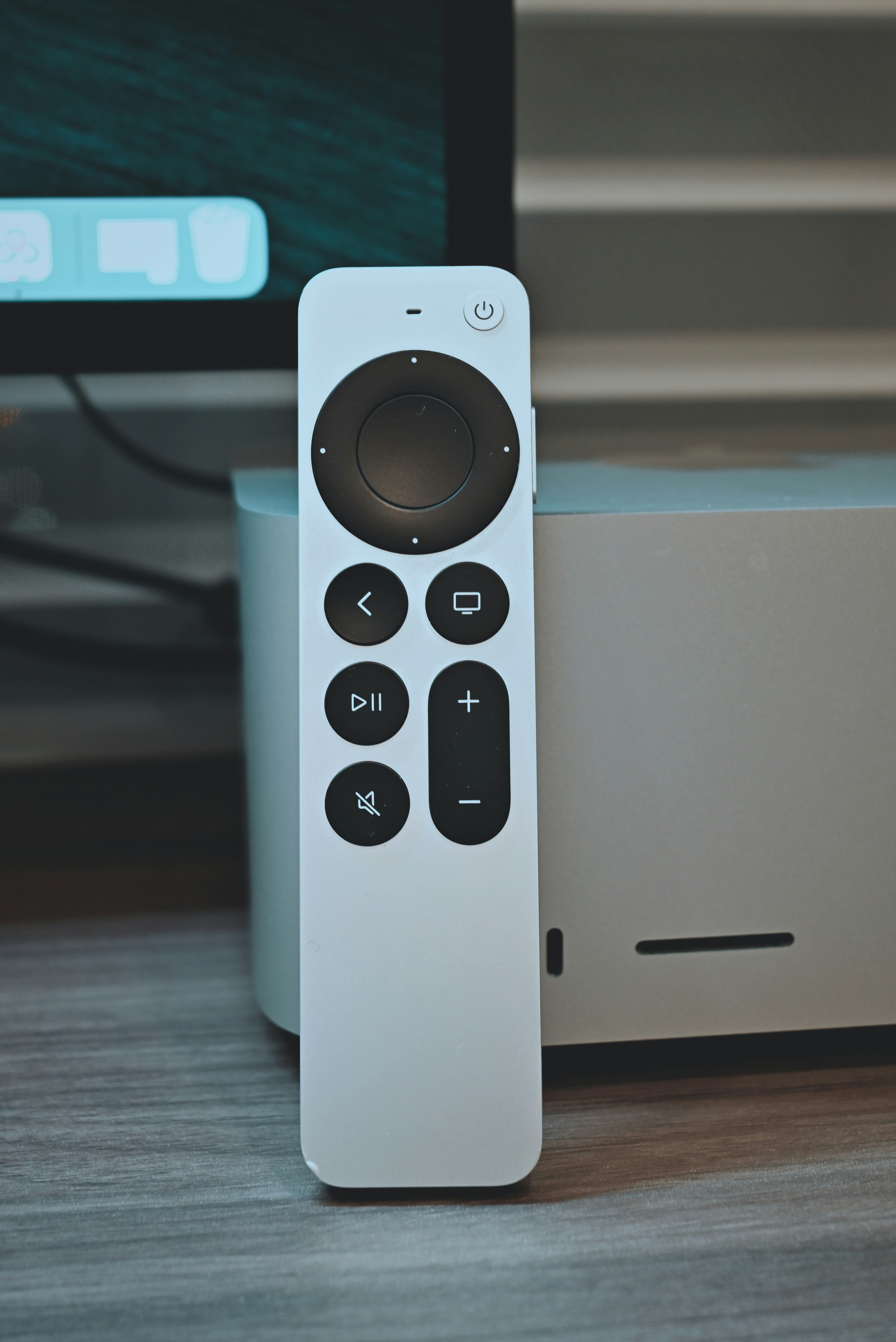 A close up of a remote control on a table photo – Free Speaker Image on ...