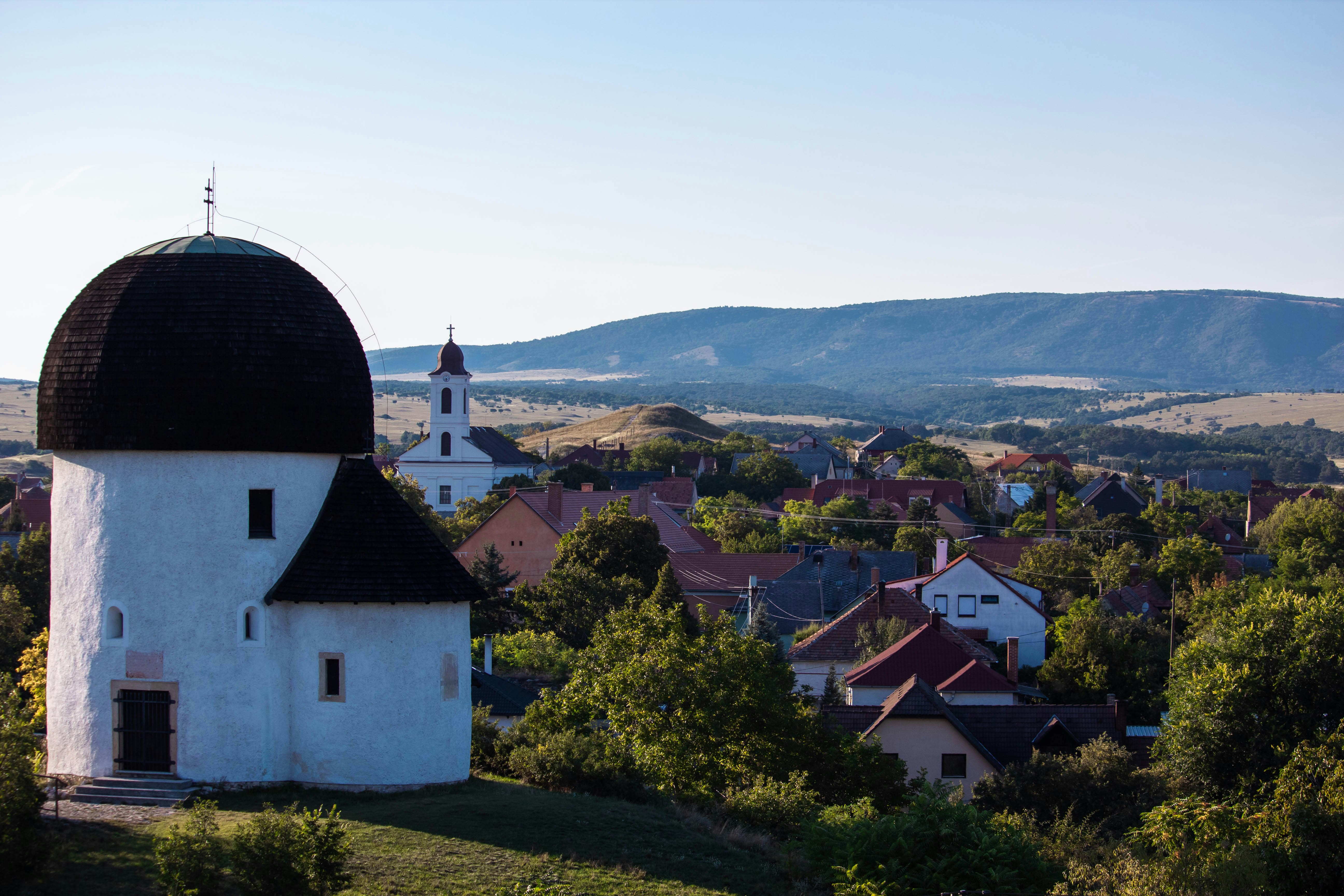 White-walled Domed Chapel Guarding a Hillside Village