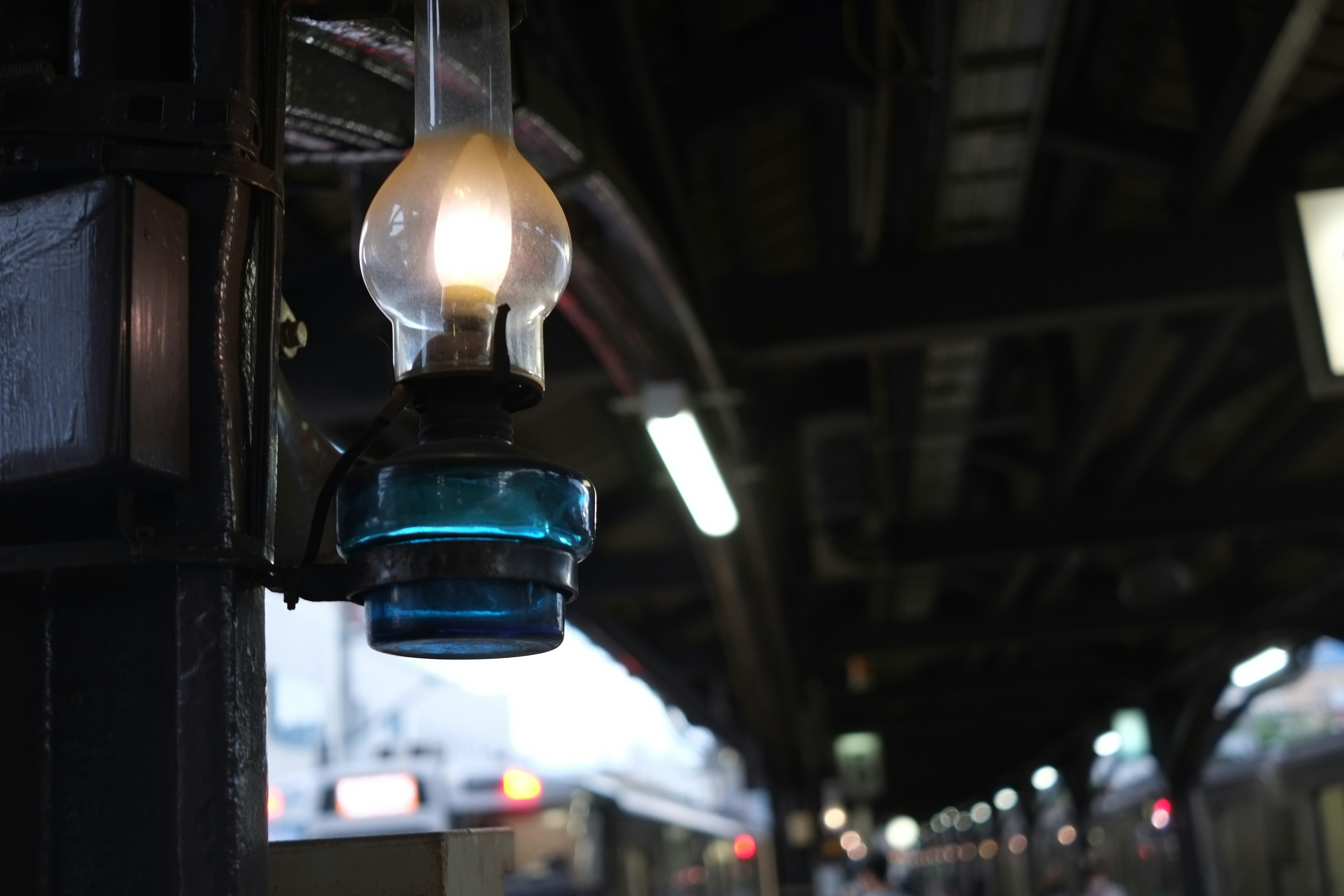 Blue-Banded Lantern Under the Platform Canopy