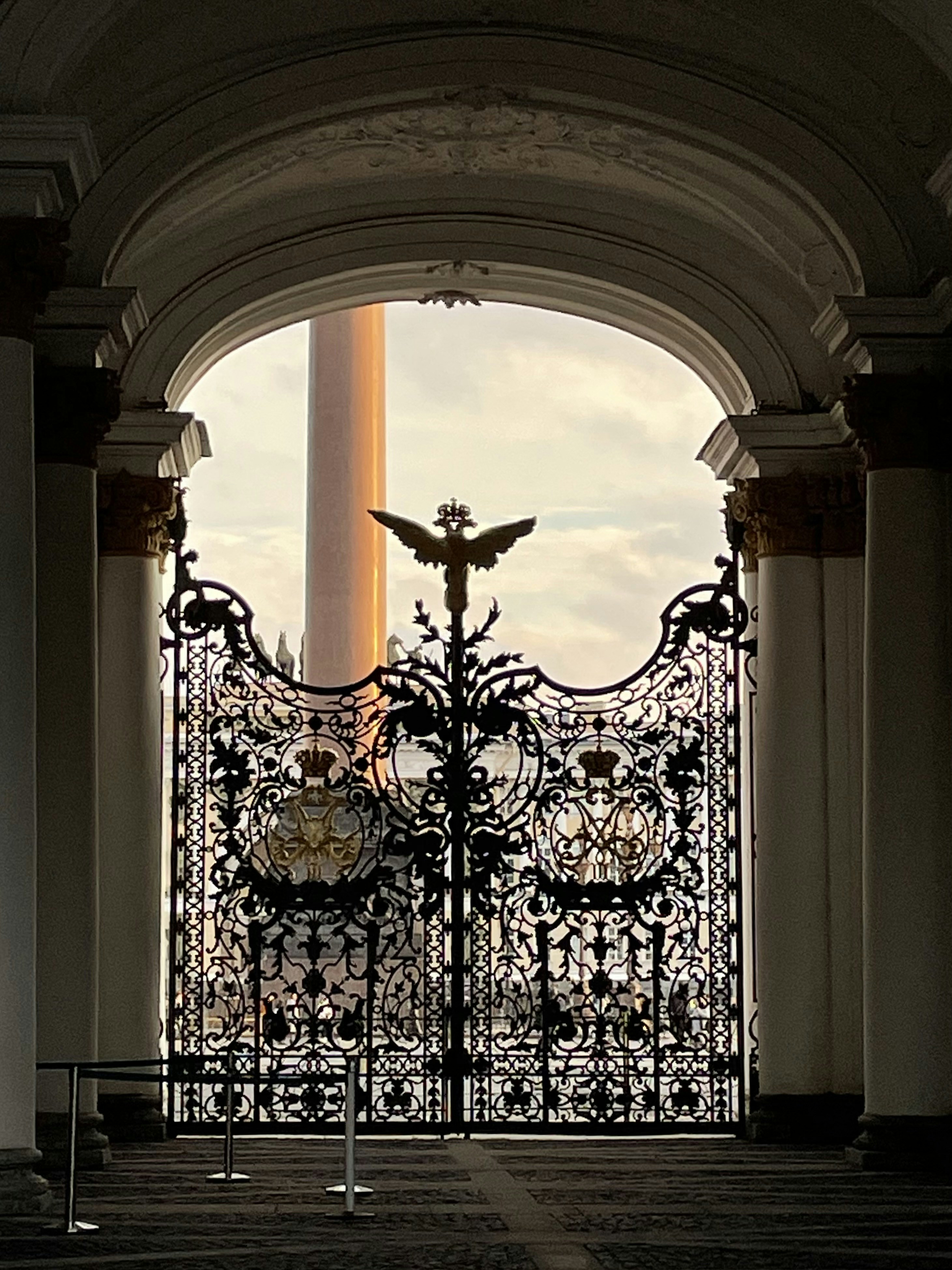 Ornate Gate at Dusk: A Carved Stairway to Light