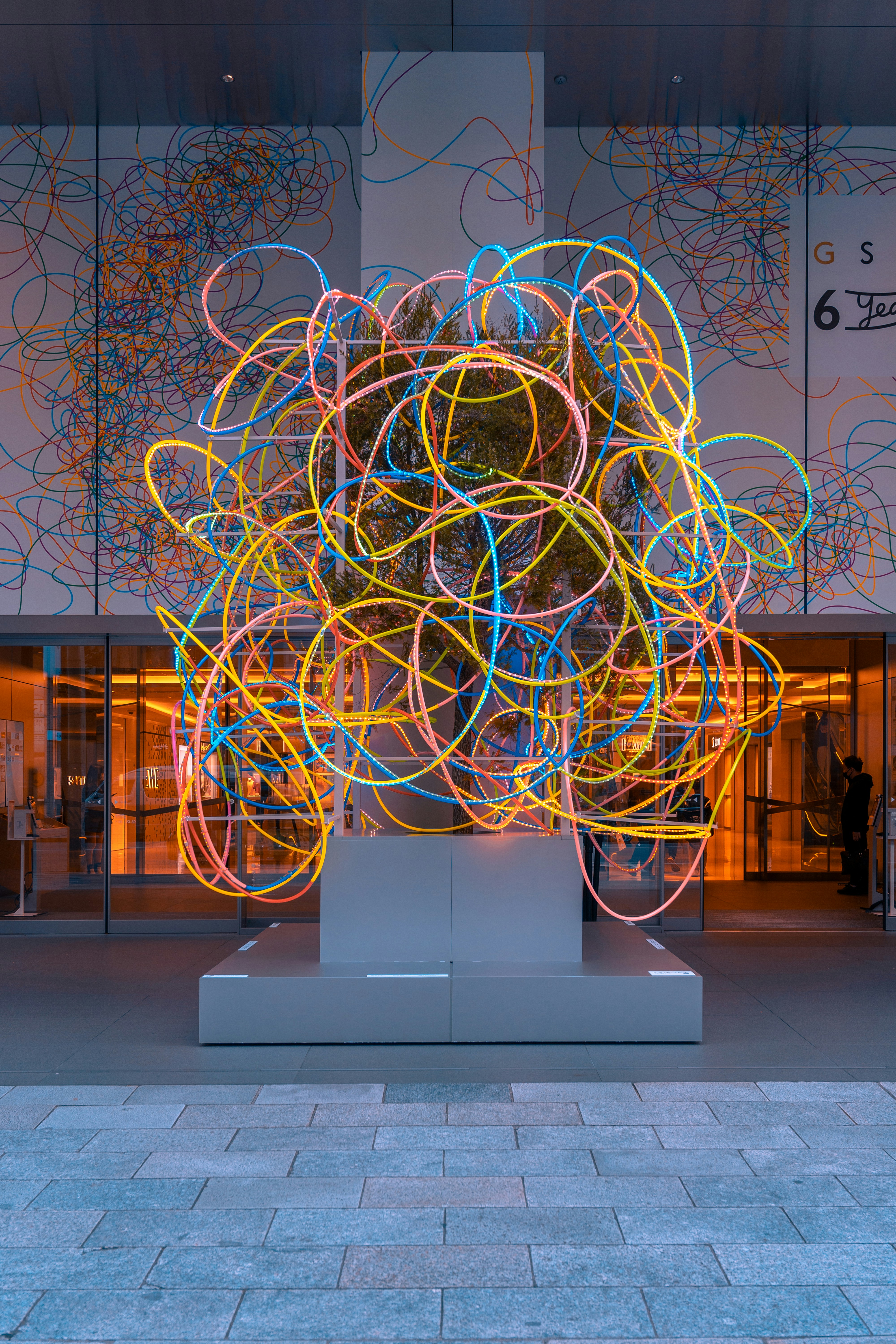 Neon Entanglement: A City-Scale Colorful Loom