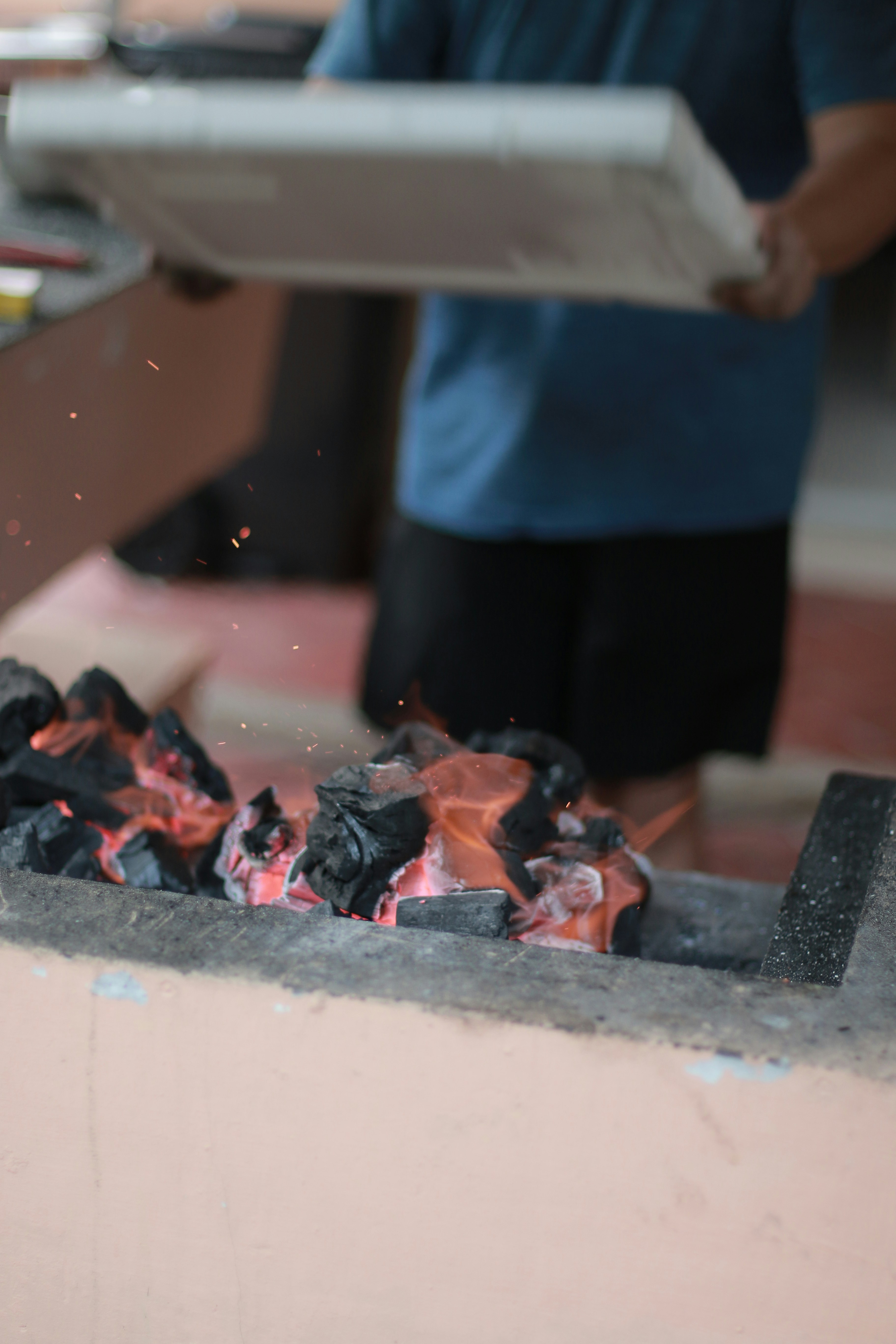 Sparks over Coals: Firepit Moment of a Backyard Grill