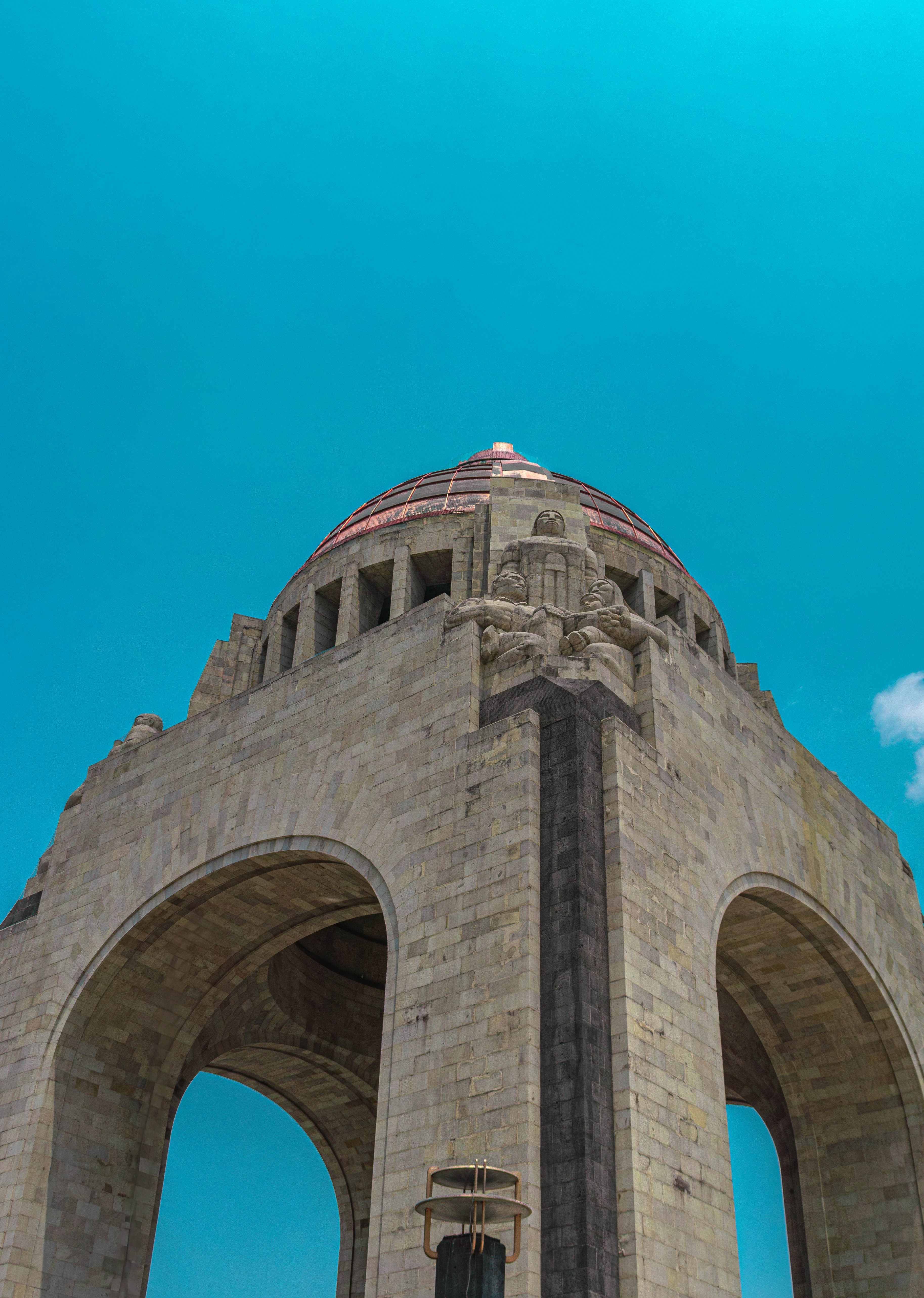 A large stone structure with a clock on top of it photo – Free ...