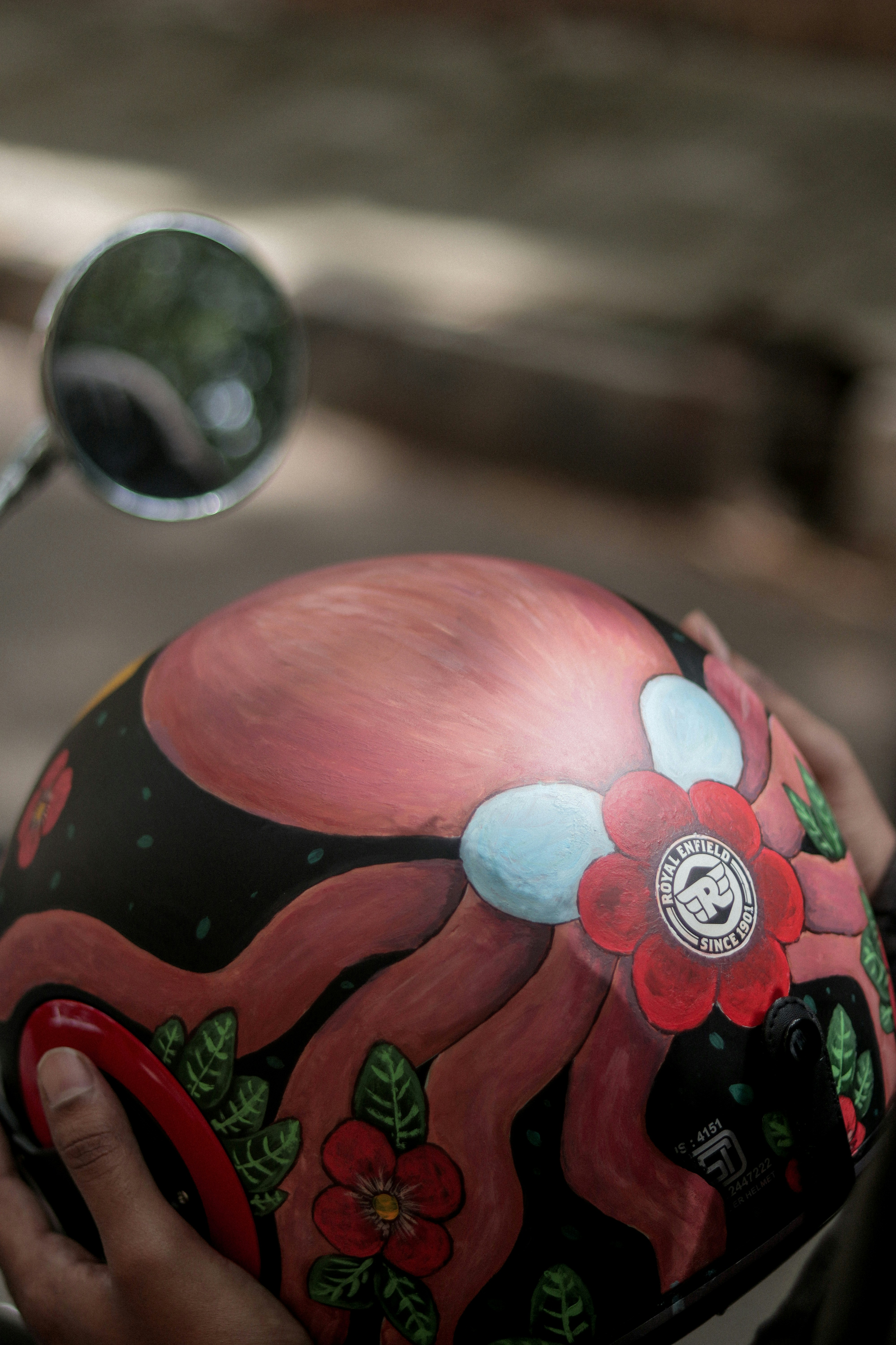 A close up of a person holding a motorcycle helmet photo – Free ...