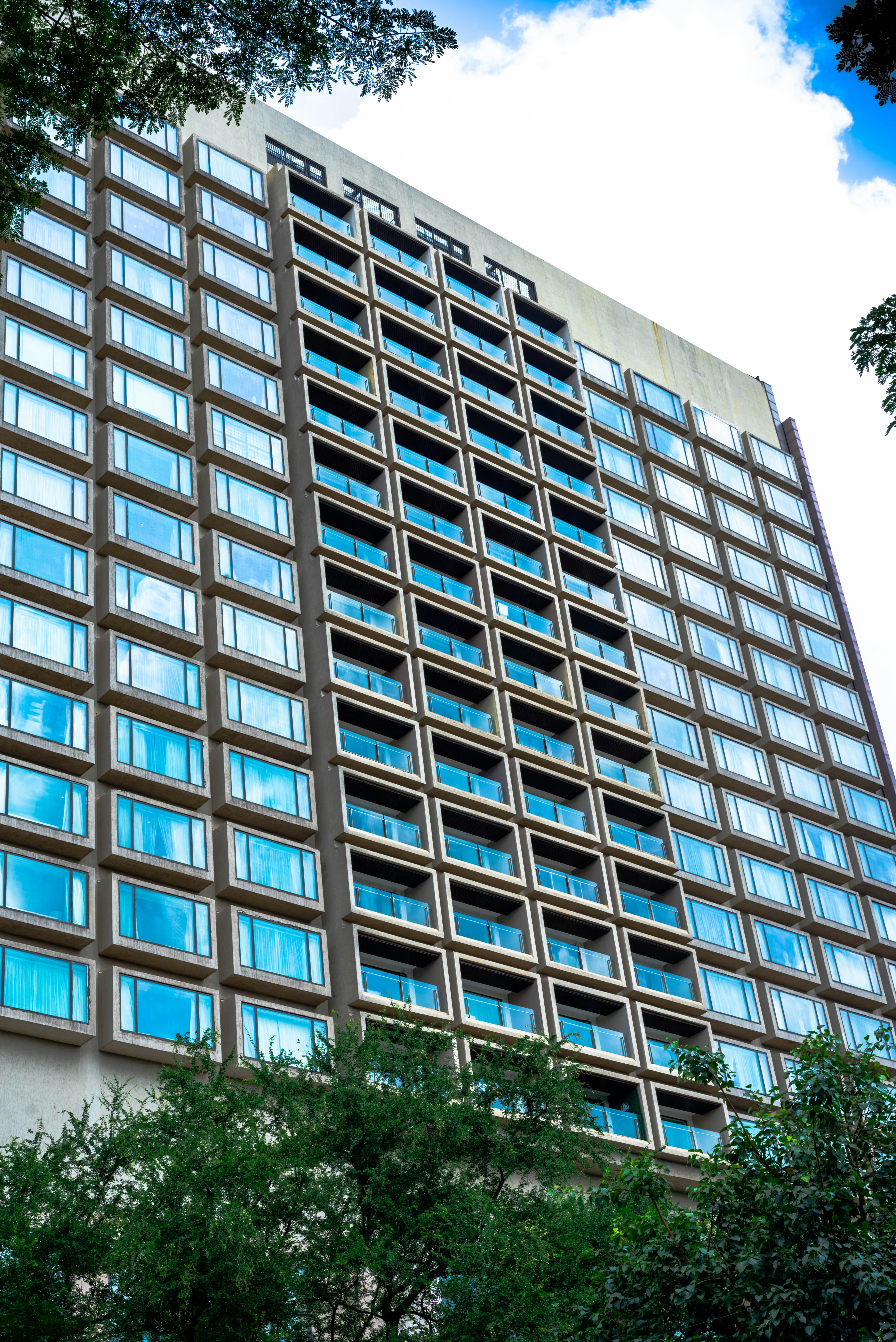 Symmetry in Glass: A Tower of Repeating Blue Windows